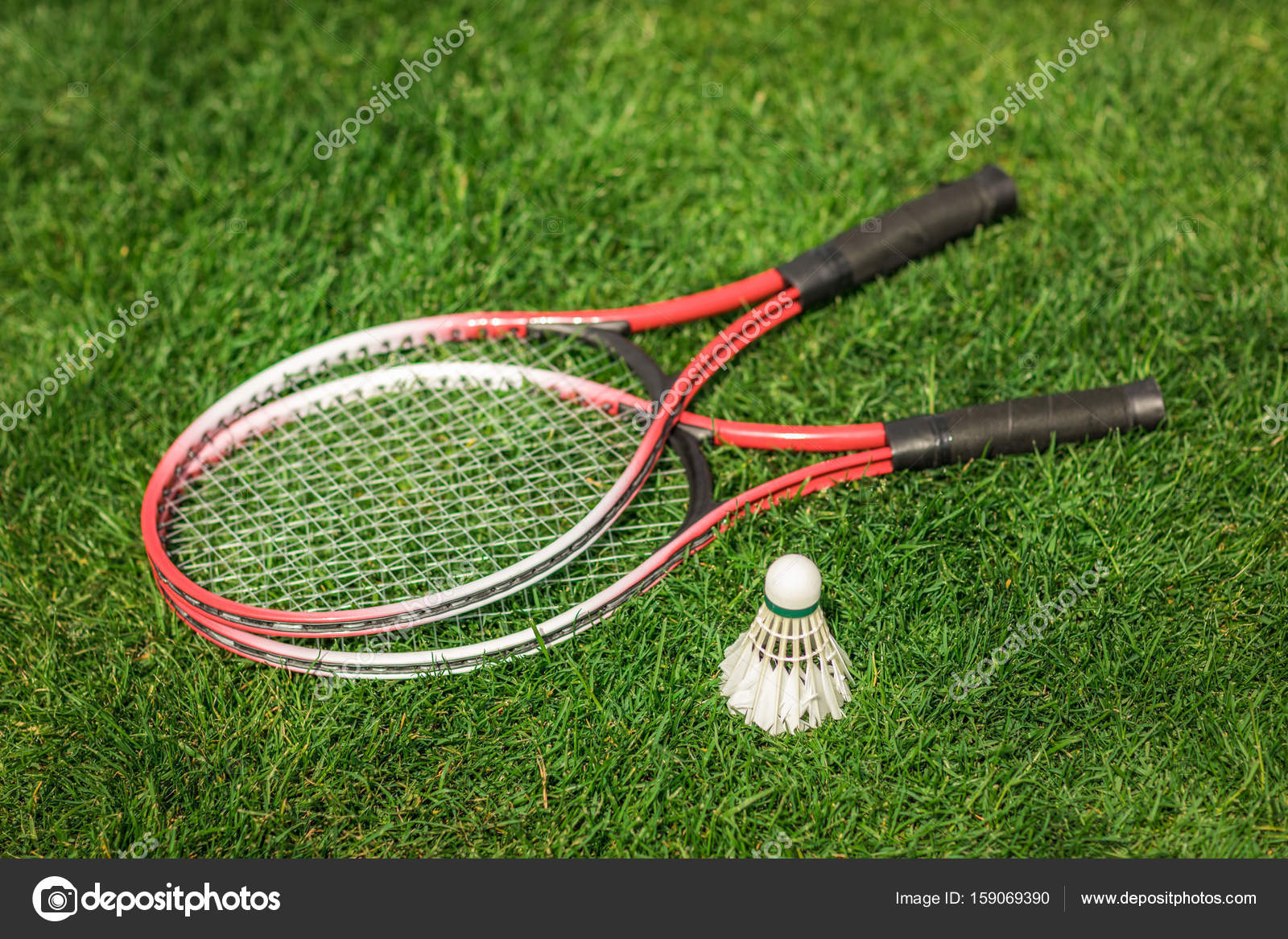 Badminton rackets with shuttlecock — Stock Photo © IgorVetushko #159069390