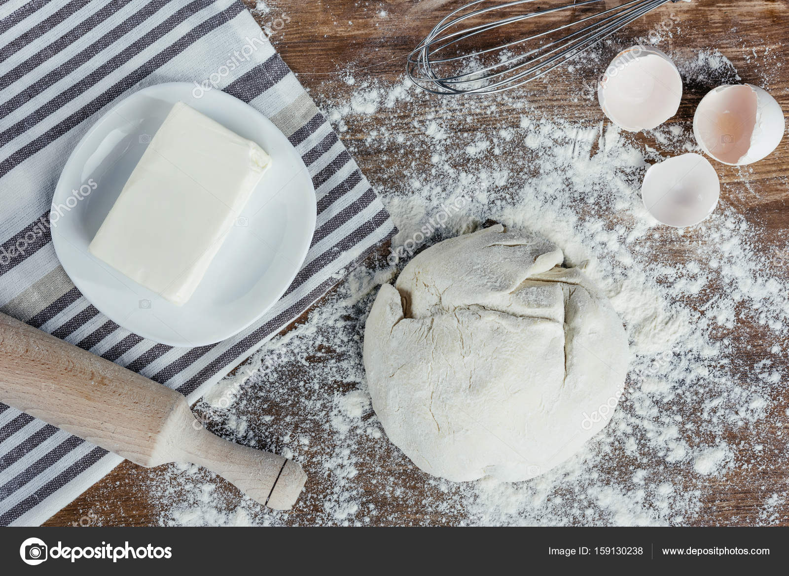 Dough with rolling pin — Stock Photo © IgorVetushko #159130238 Dough with rolling pin — Stock Photo © IgorVetushko #159130238