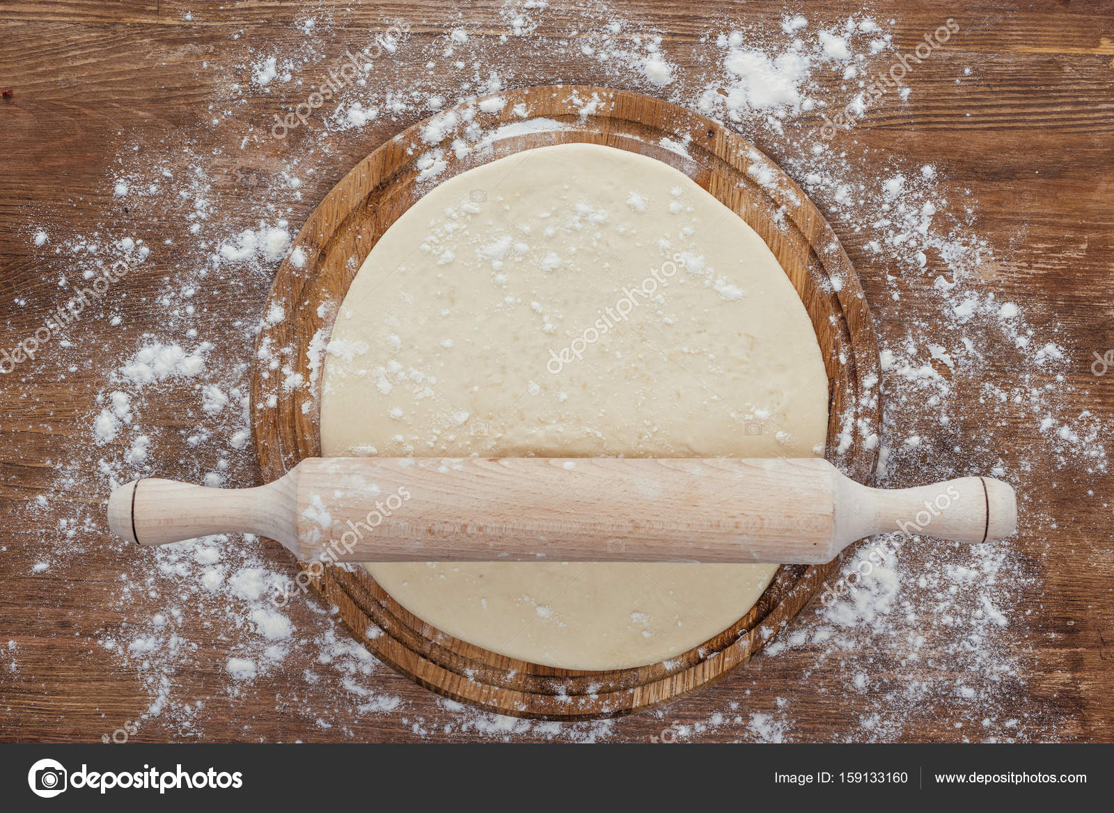 Dough with rolling pin — Stock Photo © IgorVetushko #159133160 Dough with rolling pin — Stock Photo © IgorVetushko #159133160
