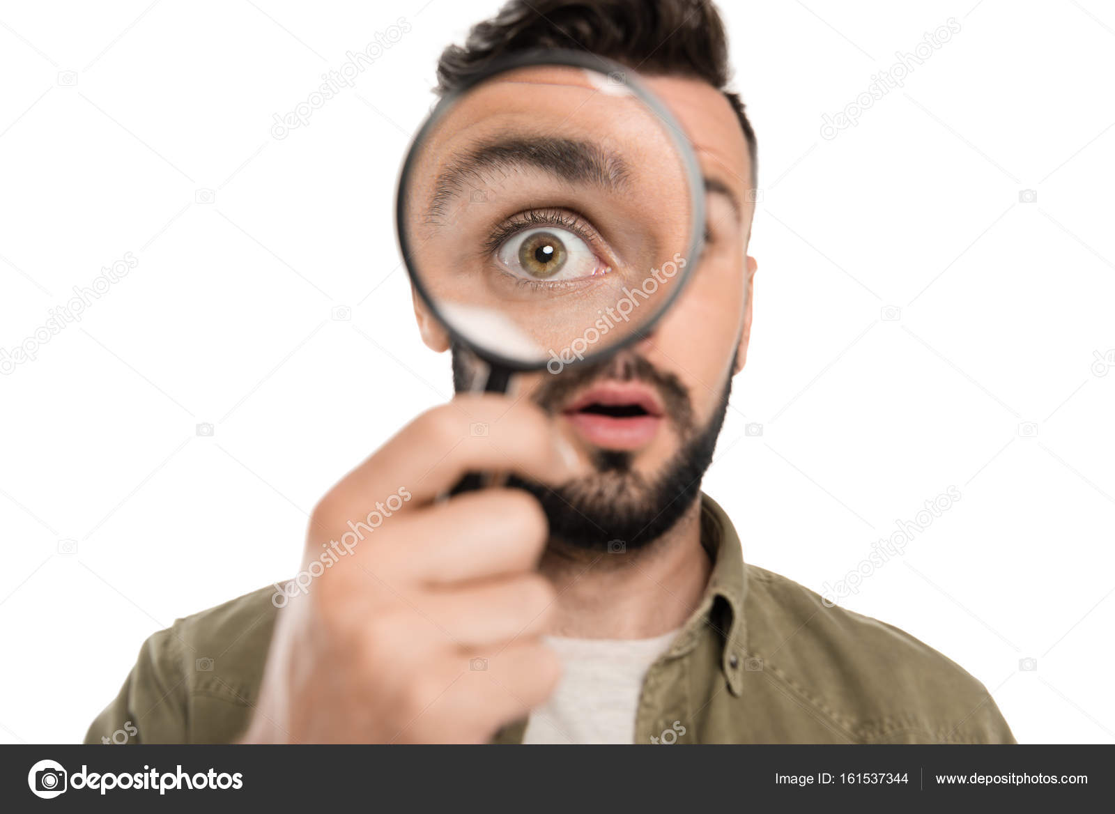 Man holding magnifying glass — Stock Photo © IgorVetushko #161537344