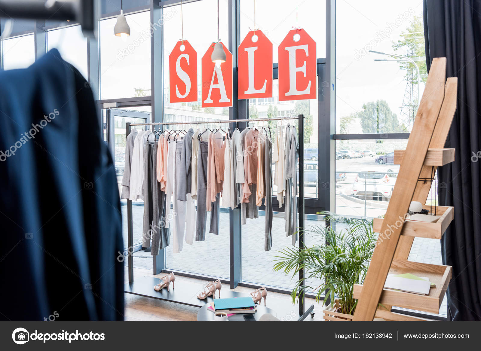Clothes store — Stock Photo © IgorVetushko #162138942