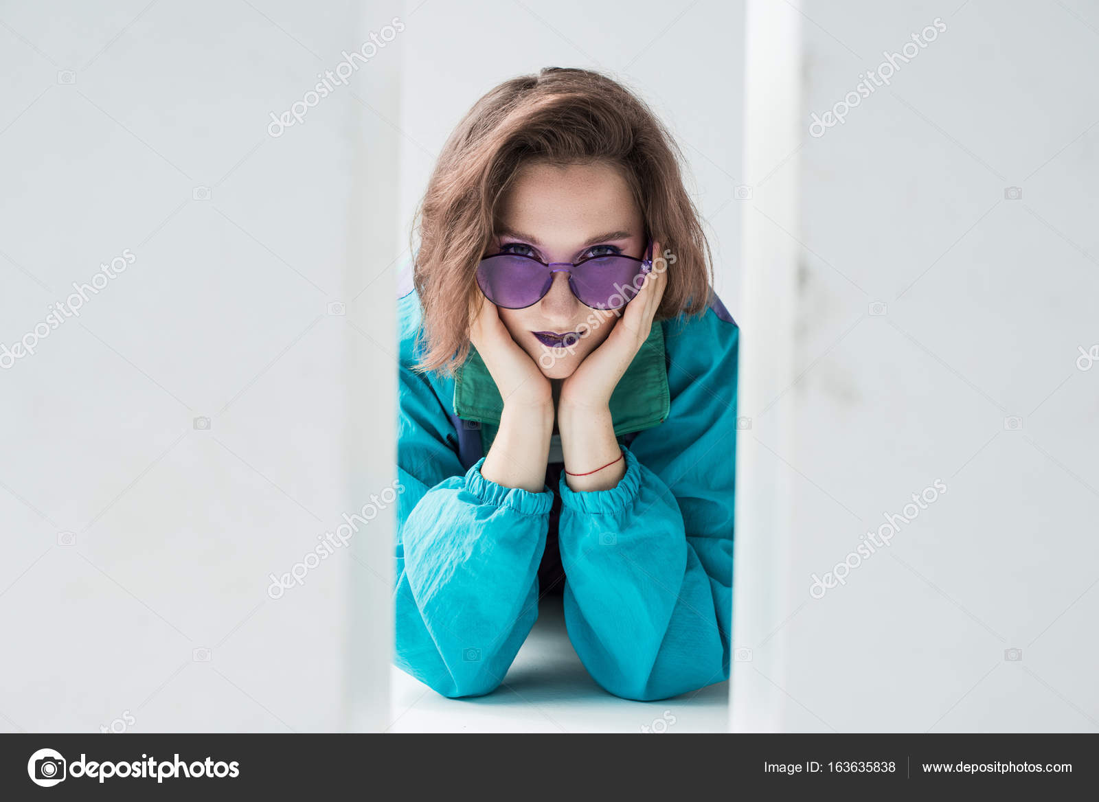 Girl in windcheater jacket and purple sunglasses — Stock Photo ...
