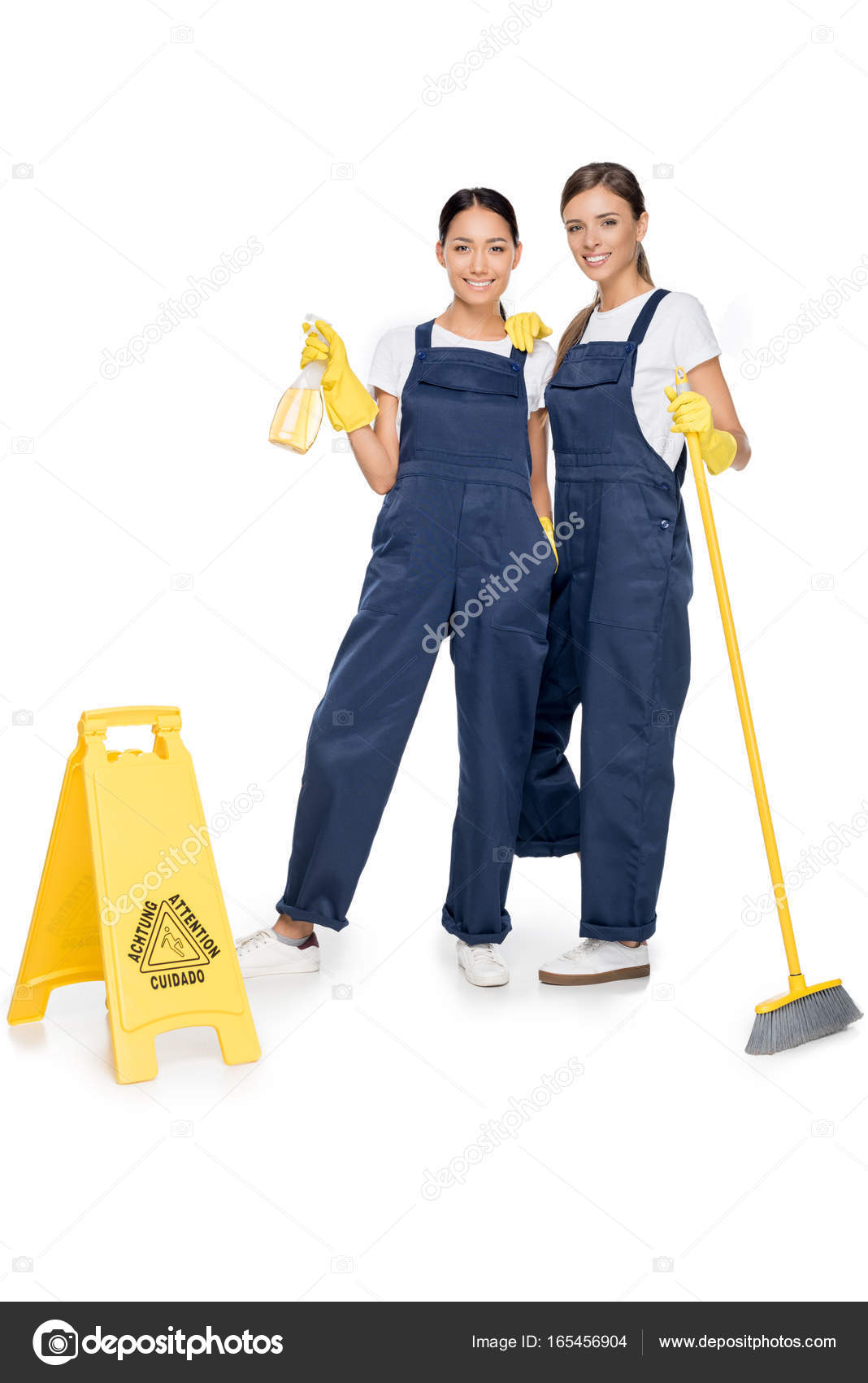 Multiethnic cleaners in uniforms — Stock Photo © IgorVetushko #165456904