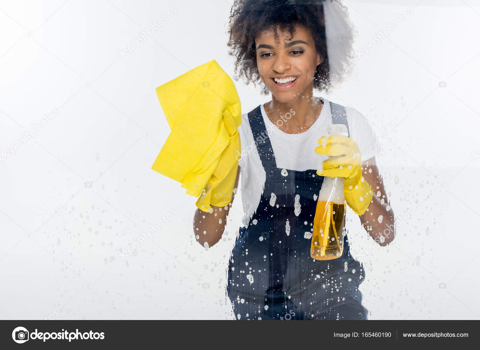 African american cleaner cleaning window — Stock Photo © IgorVetushko ...