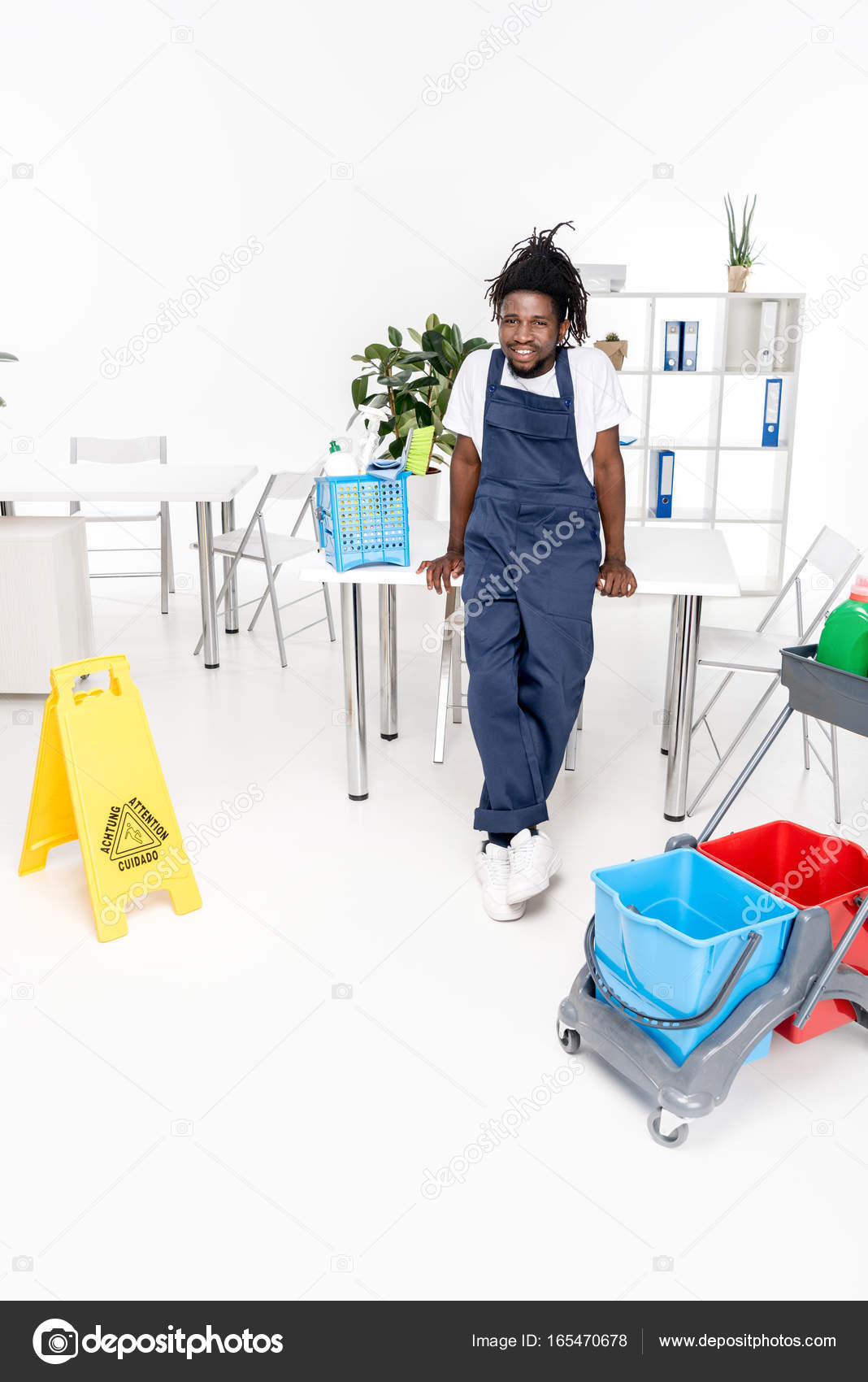 African american cleaner — Stock Photo © IgorVetushko #165470678