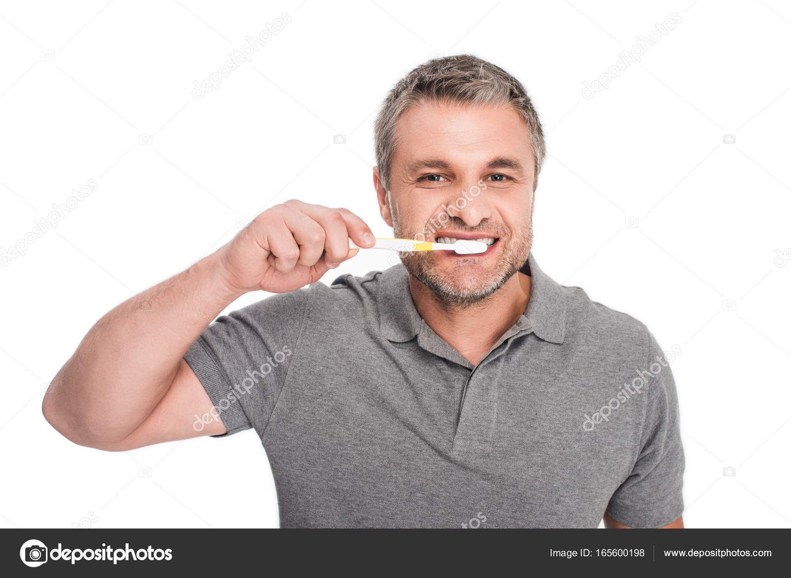 Man brushing teeth — Stock Photo © IgorVetushko #165600198