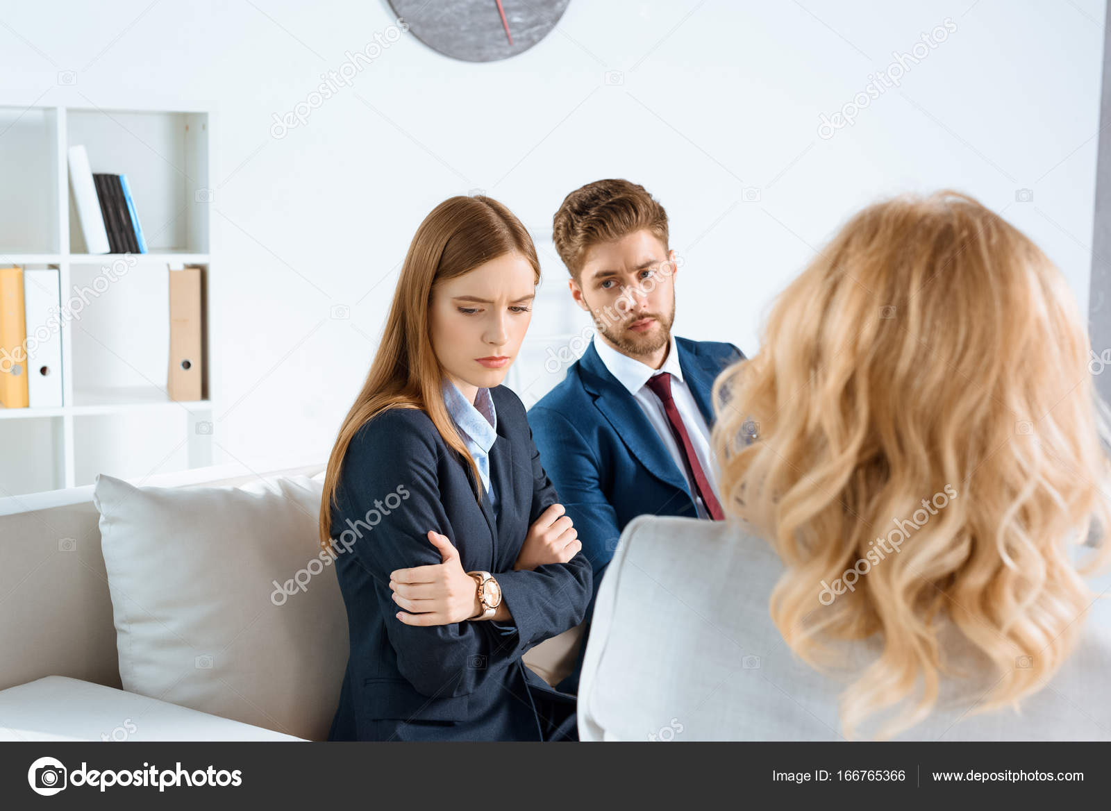 Young couple and psychologist — Stock Photo © IgorVetushko #166765366