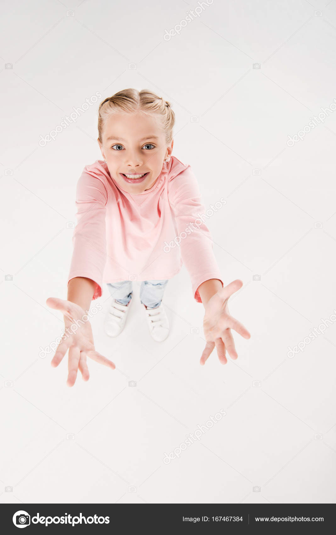 Child with arms raised up ⬇ Stock Photo, Image by © IgorVetushko #167467384