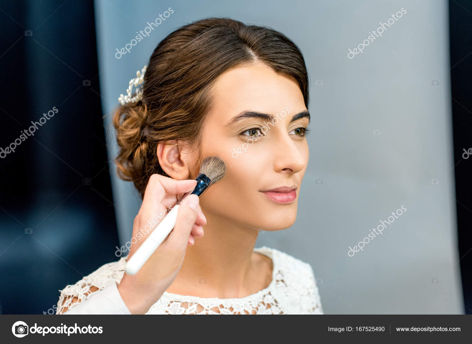 Woman getting makeup done — Stock Photo © IgorVetushko #167525490