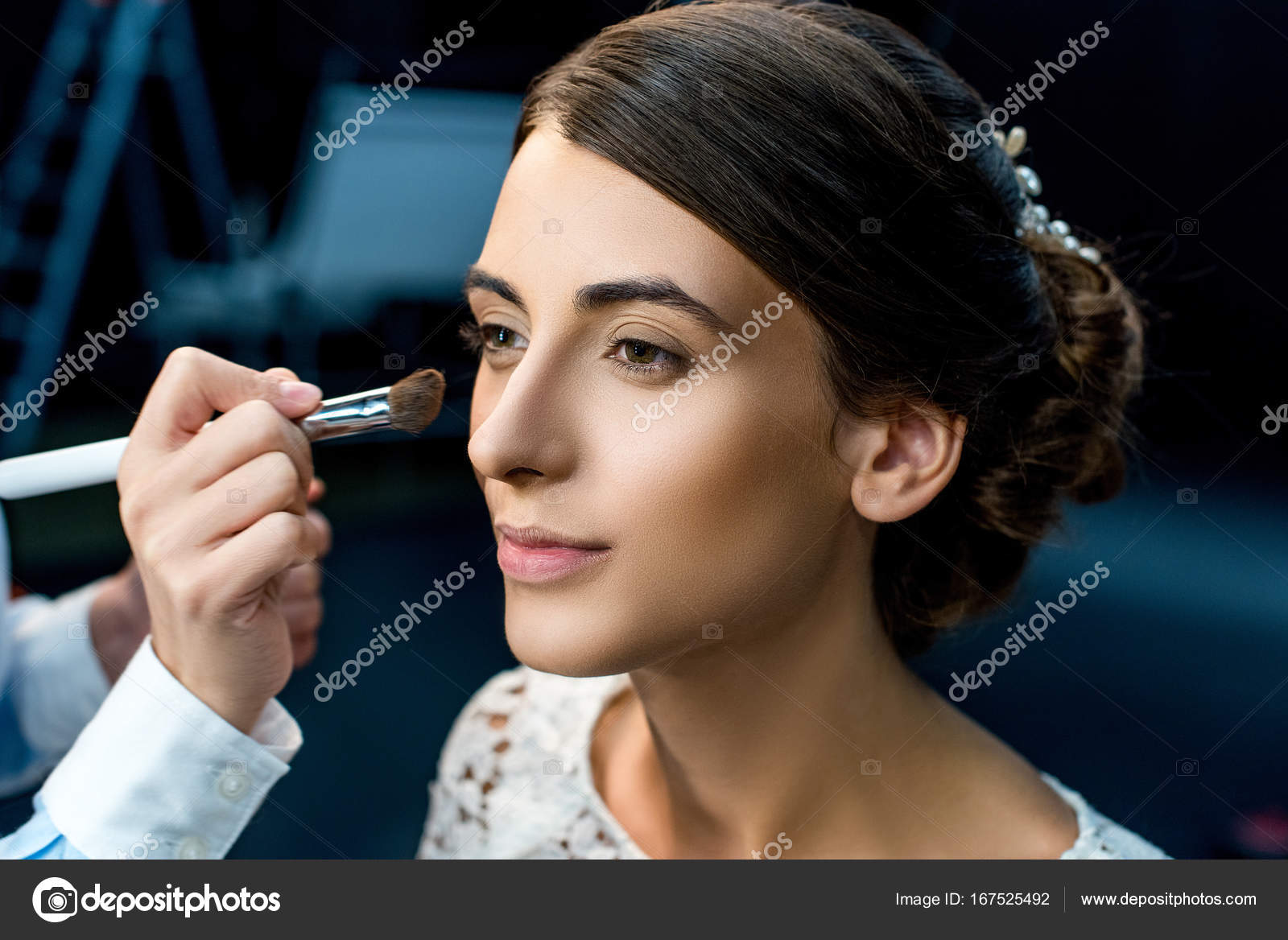 Woman getting makeup done — Stock Photo © IgorVetushko #167525492