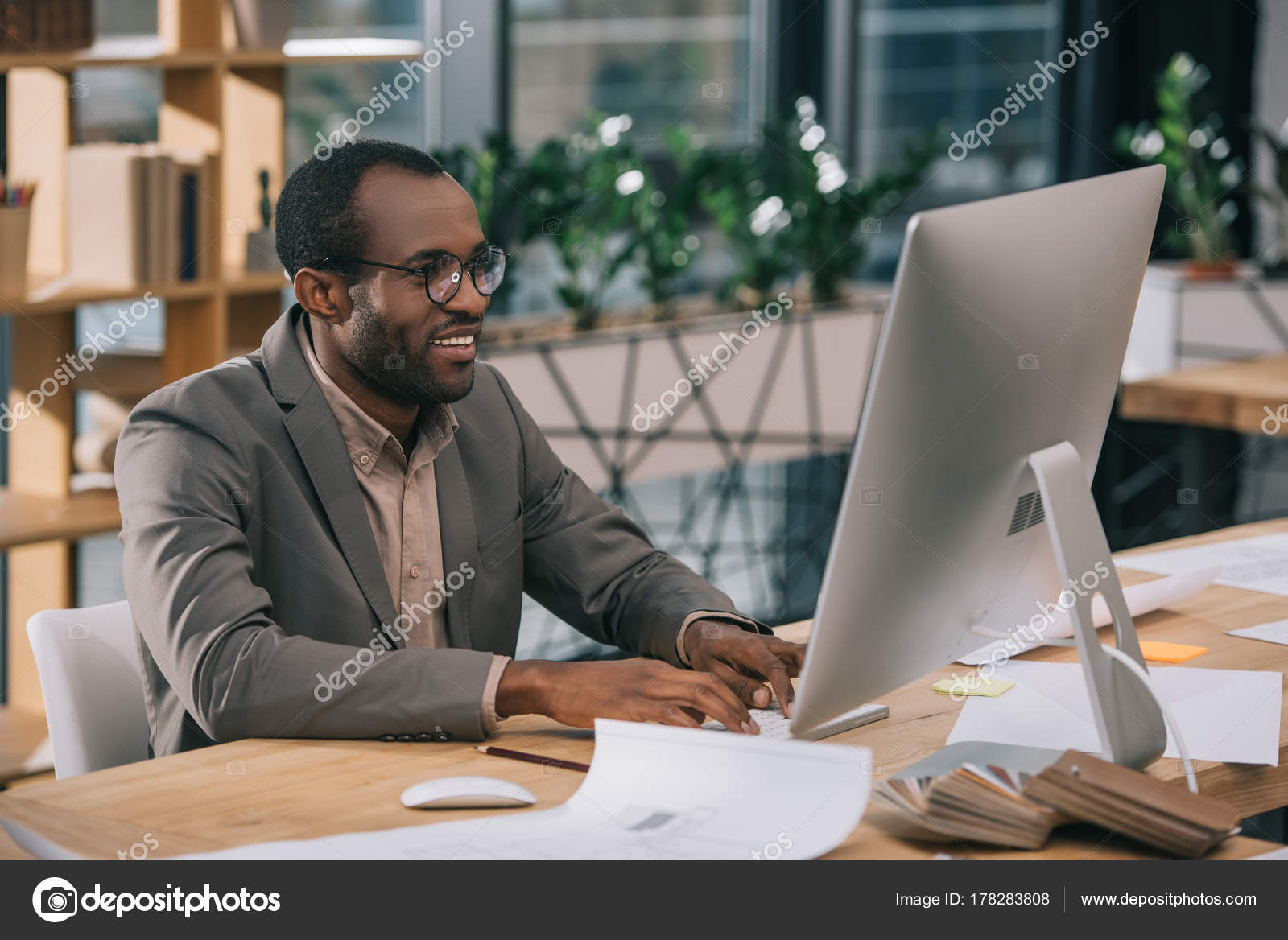 African American Architect Working Computer Blueprints Office ⬇ Stock ...
