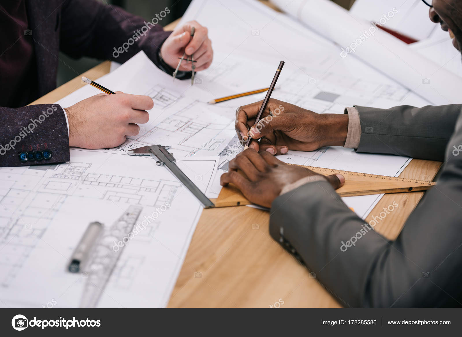 Cropped Shot Architects Drawing Architectural Plans Together Stock ...