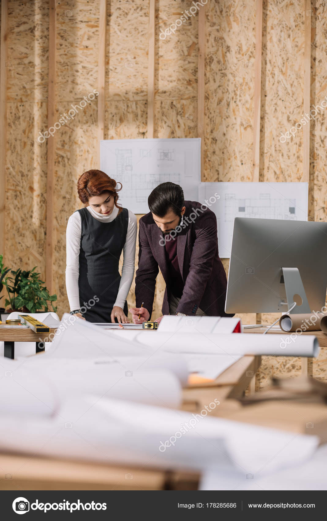 Young Architects Discussing Architectural Plans Office — Stock Photo ...