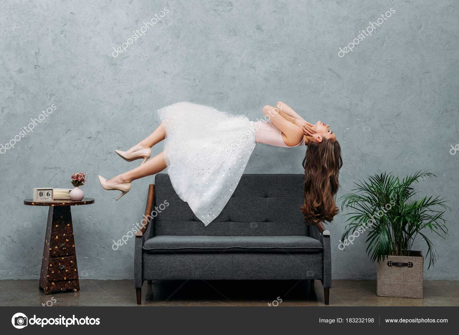 Beautiful Barefoot Girl Hovering Couch — Stock Photo © IgorVetushko ...