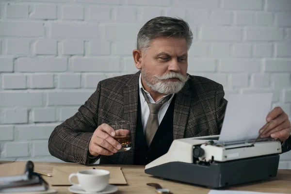 Handsome Senior Writer Reading Manuscript Magnifying Glass Stock Photo ...