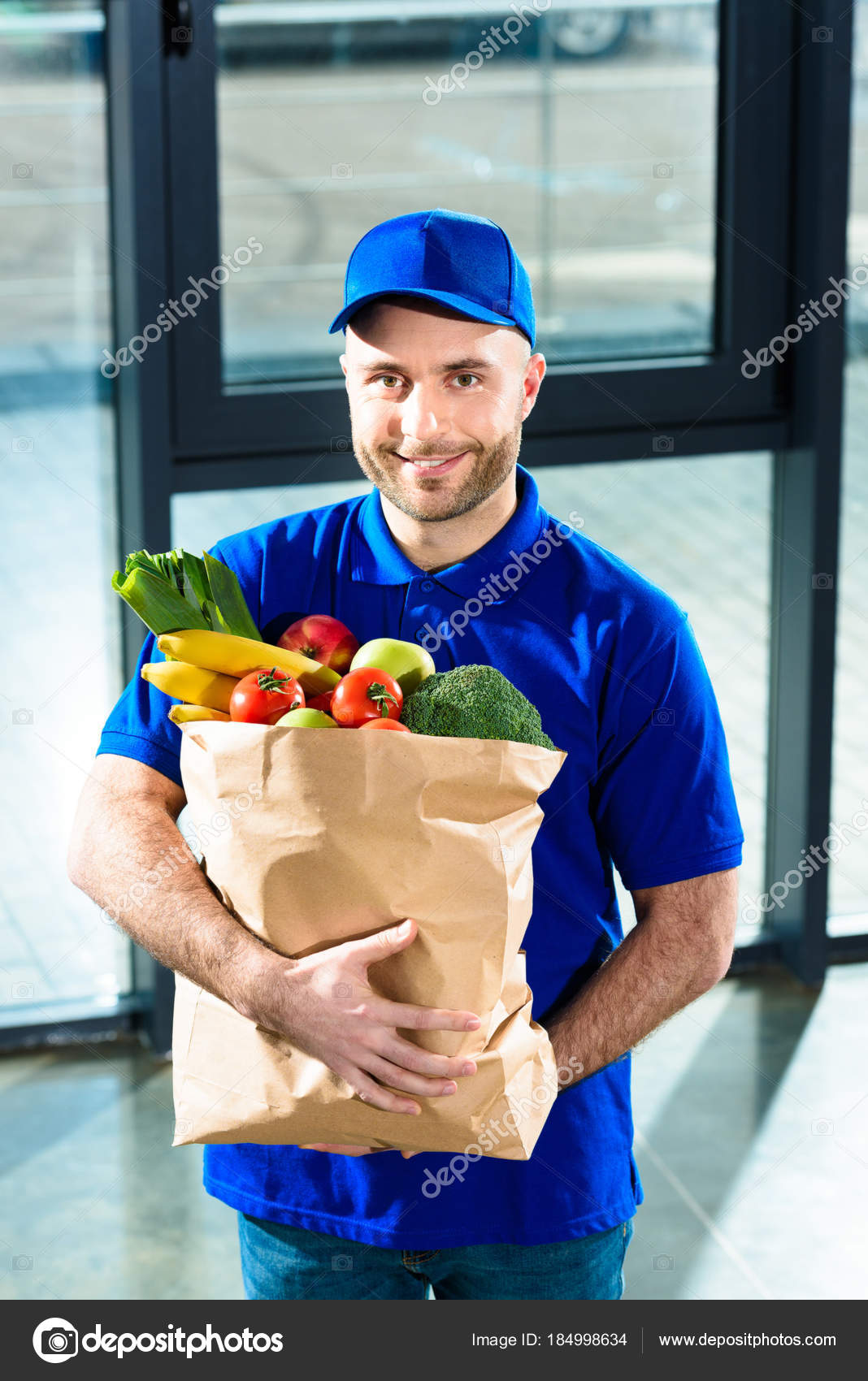 Delivery Man Holding Paper Bag Fresh Fruits Vegetables — Stock Photo ... Delivery Man Holding Paper Bag Fresh Fruits Vegetables — Stock Photo ...