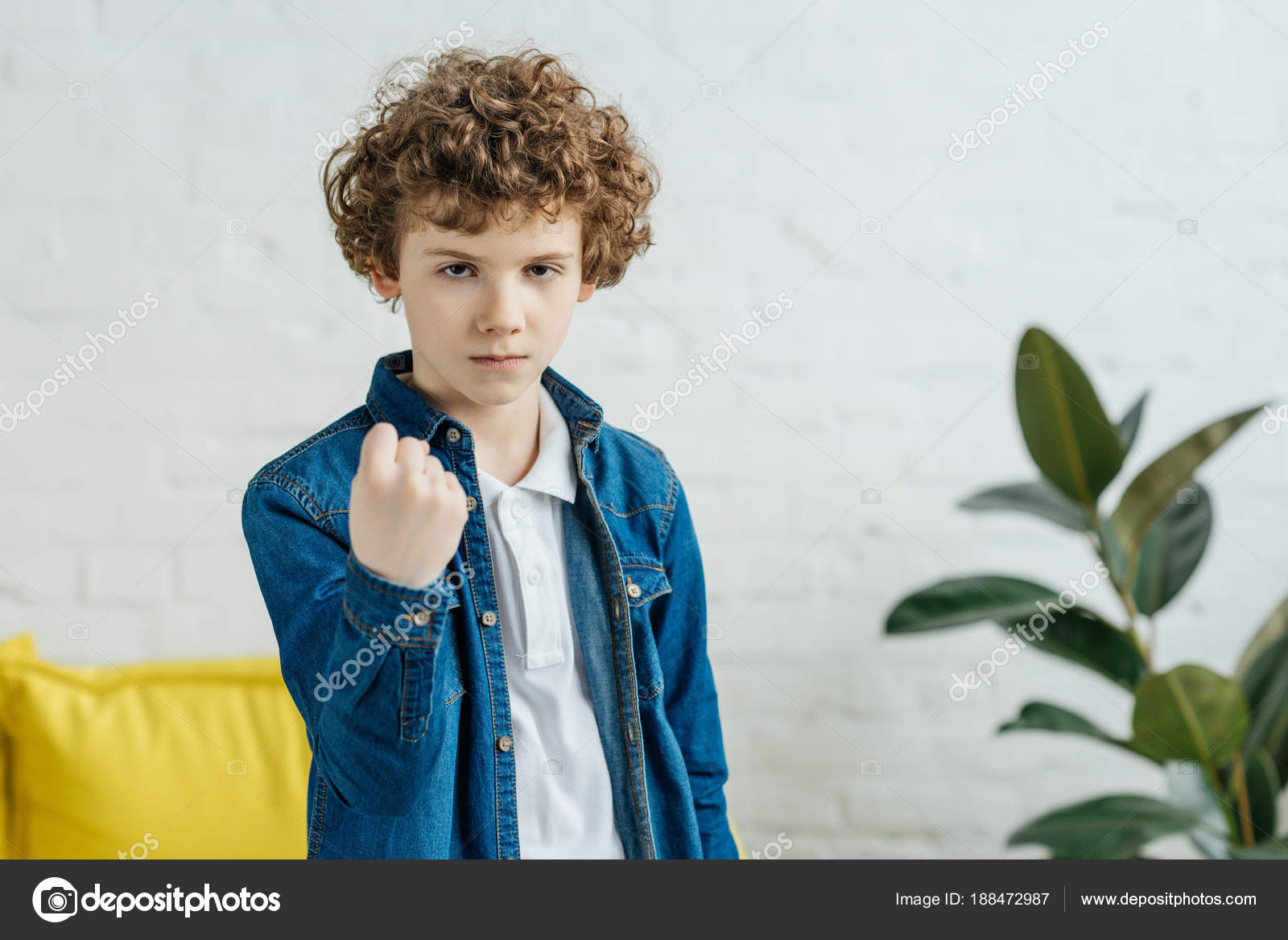 Angry Child Boy Showing Clenched Fist Stock Photo by ©IgorVetushko ...
