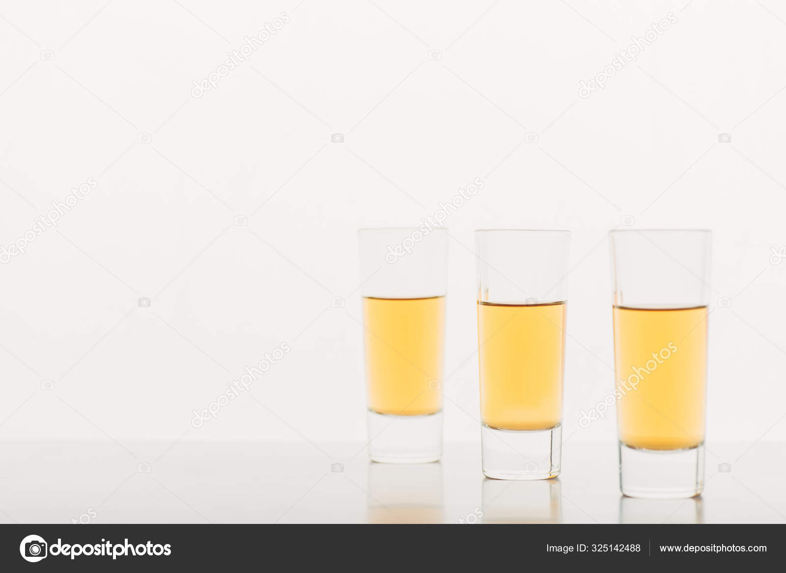 Three Shots Alcohol Row Isolated White — Stock Photo © IgorVetushko ...