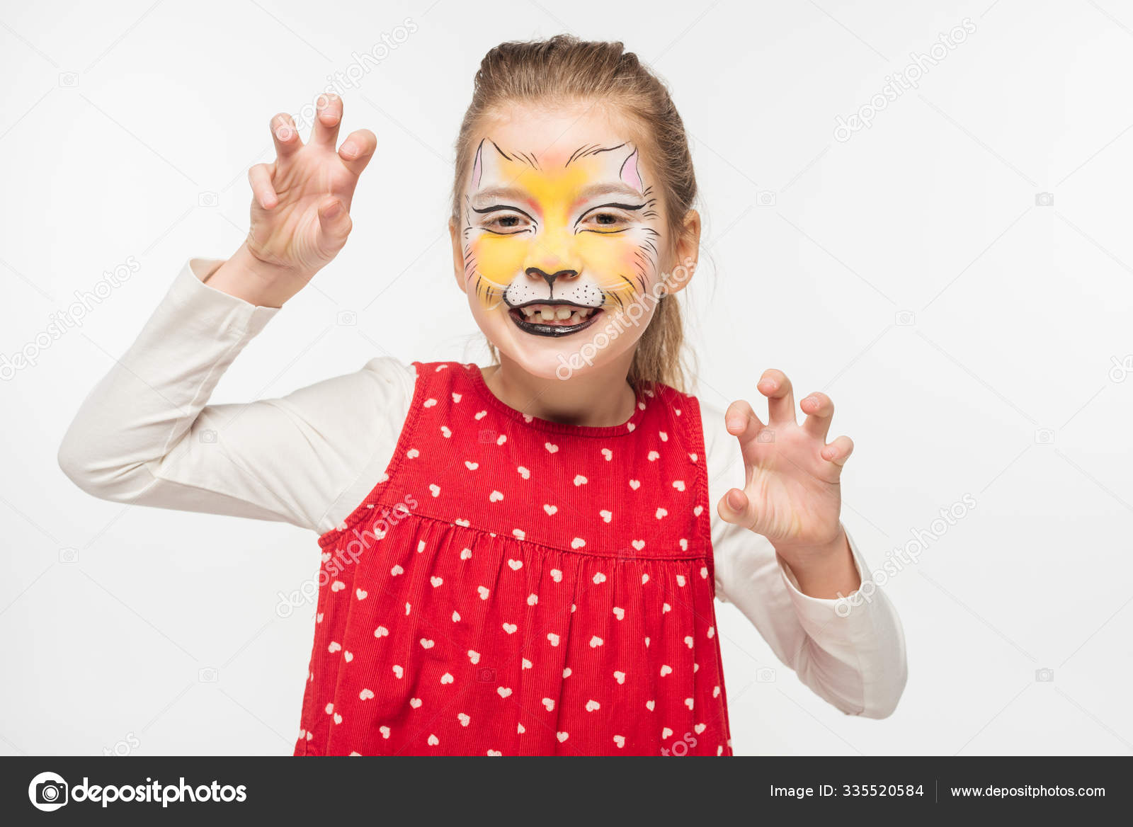 Cute Kid Tiger Muzzle Painting Face Showing Frightening Gesture While ...