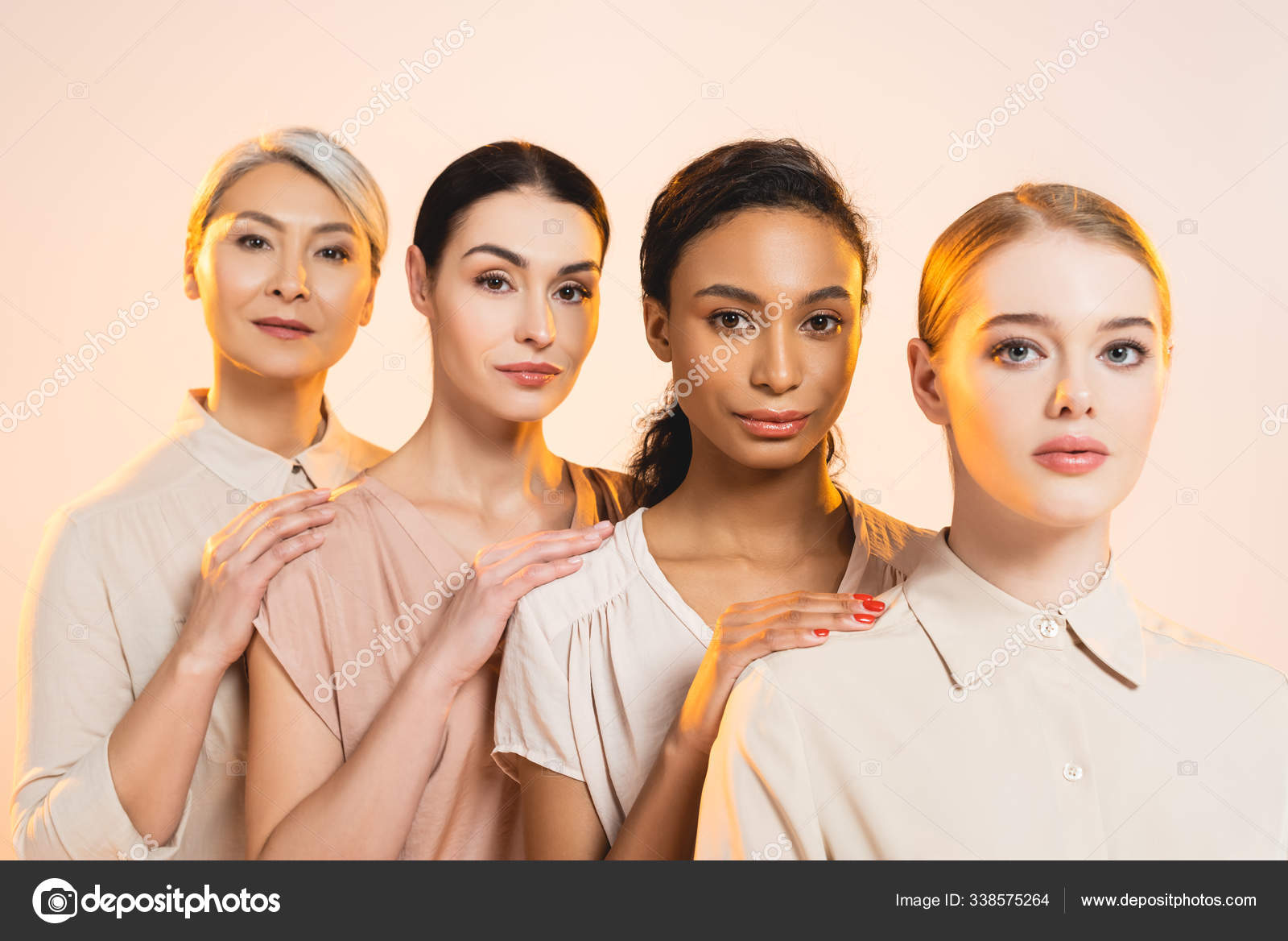 Four Beautiful Multicultural Women Looking Camera Isolated Beige Stock ...