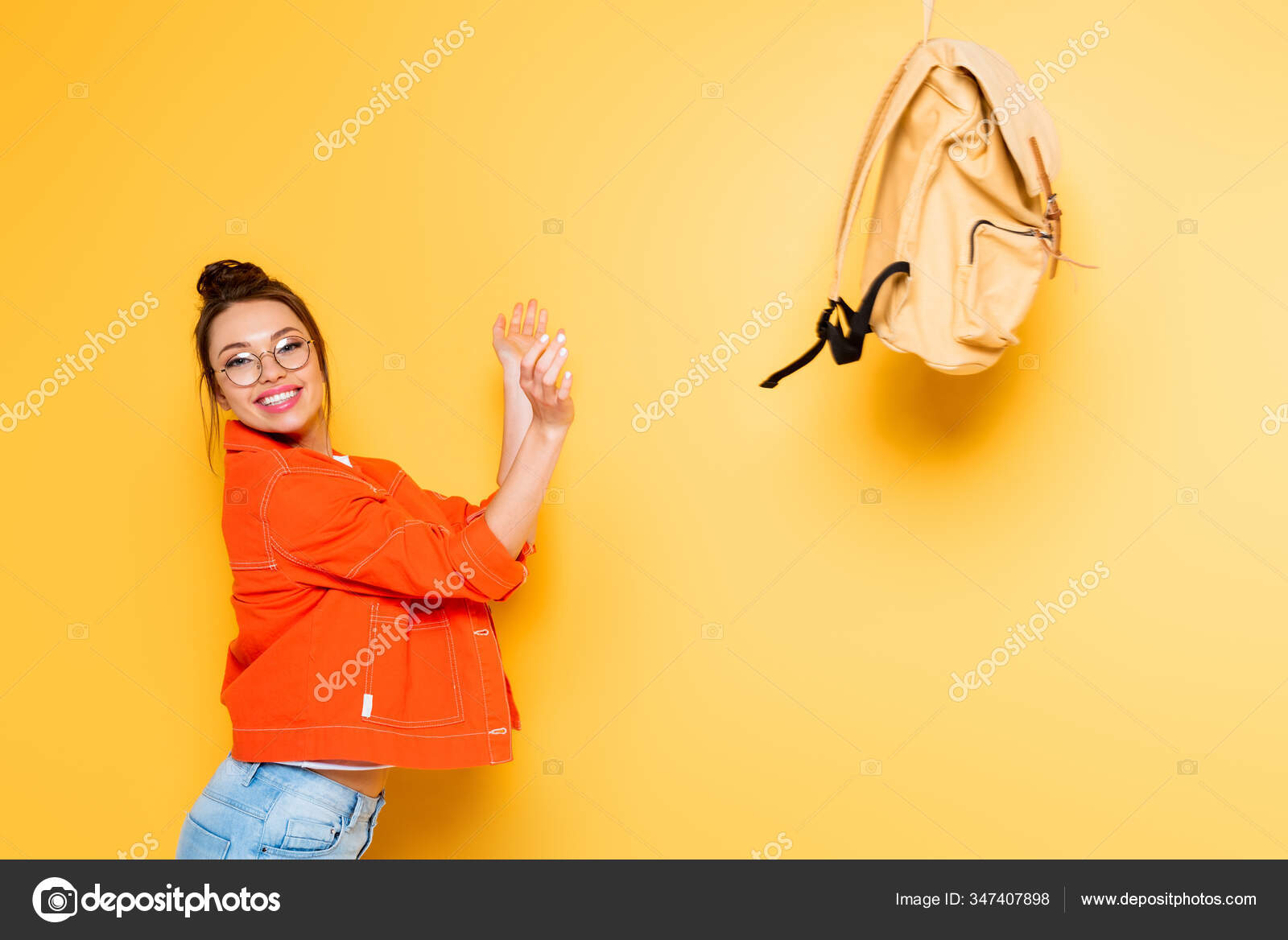 Excited Student Throwing Backpack While Smiling Camera Yellow ...