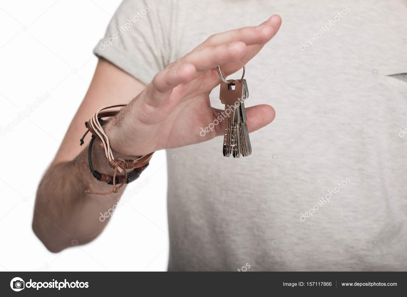Man holding keys — Stock Photo © AllaSerebrina #157117866