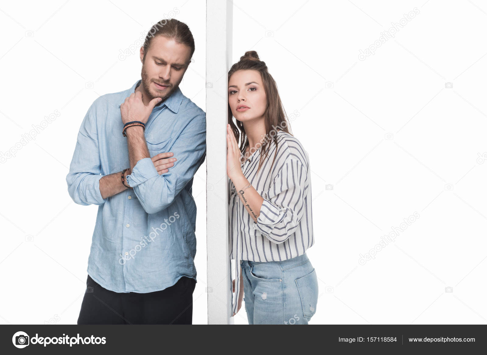Young couple separated by wall — Stock Photo © AllaSerebrina #157118584