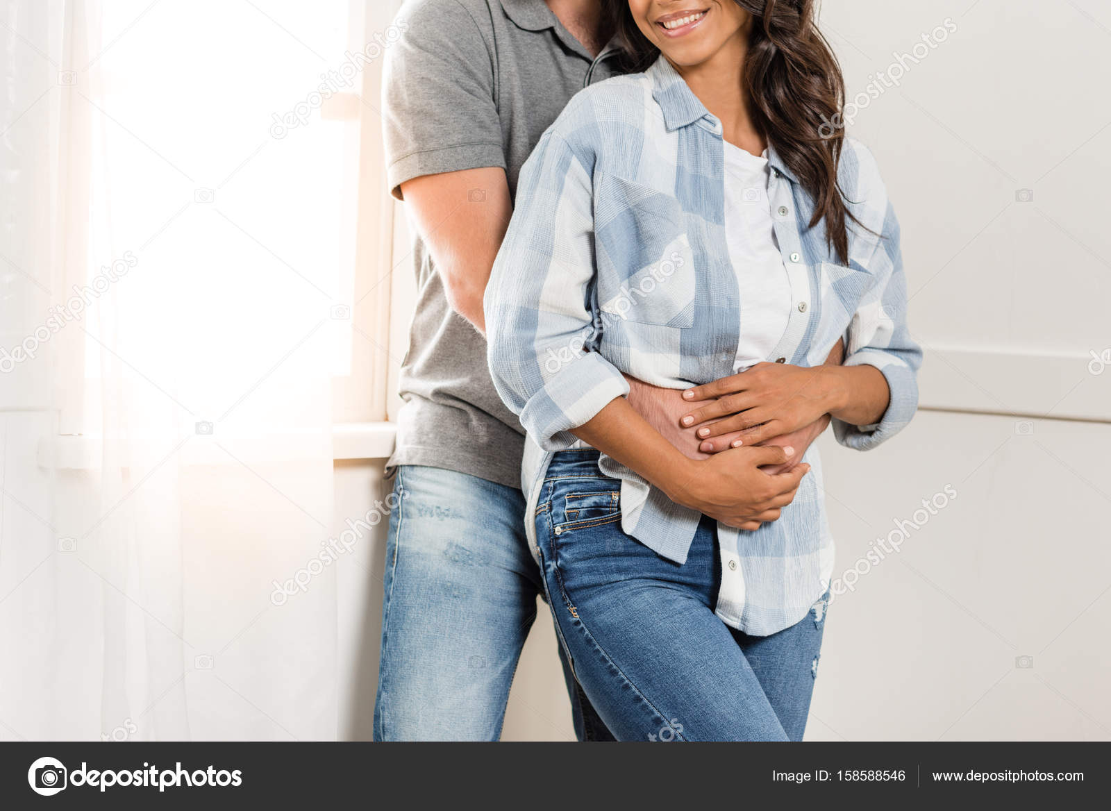Young couple hugging together — Stock Photo © AllaSerebrina #158588546 Young couple hugging together — Stock Photo © AllaSerebrina #158588546