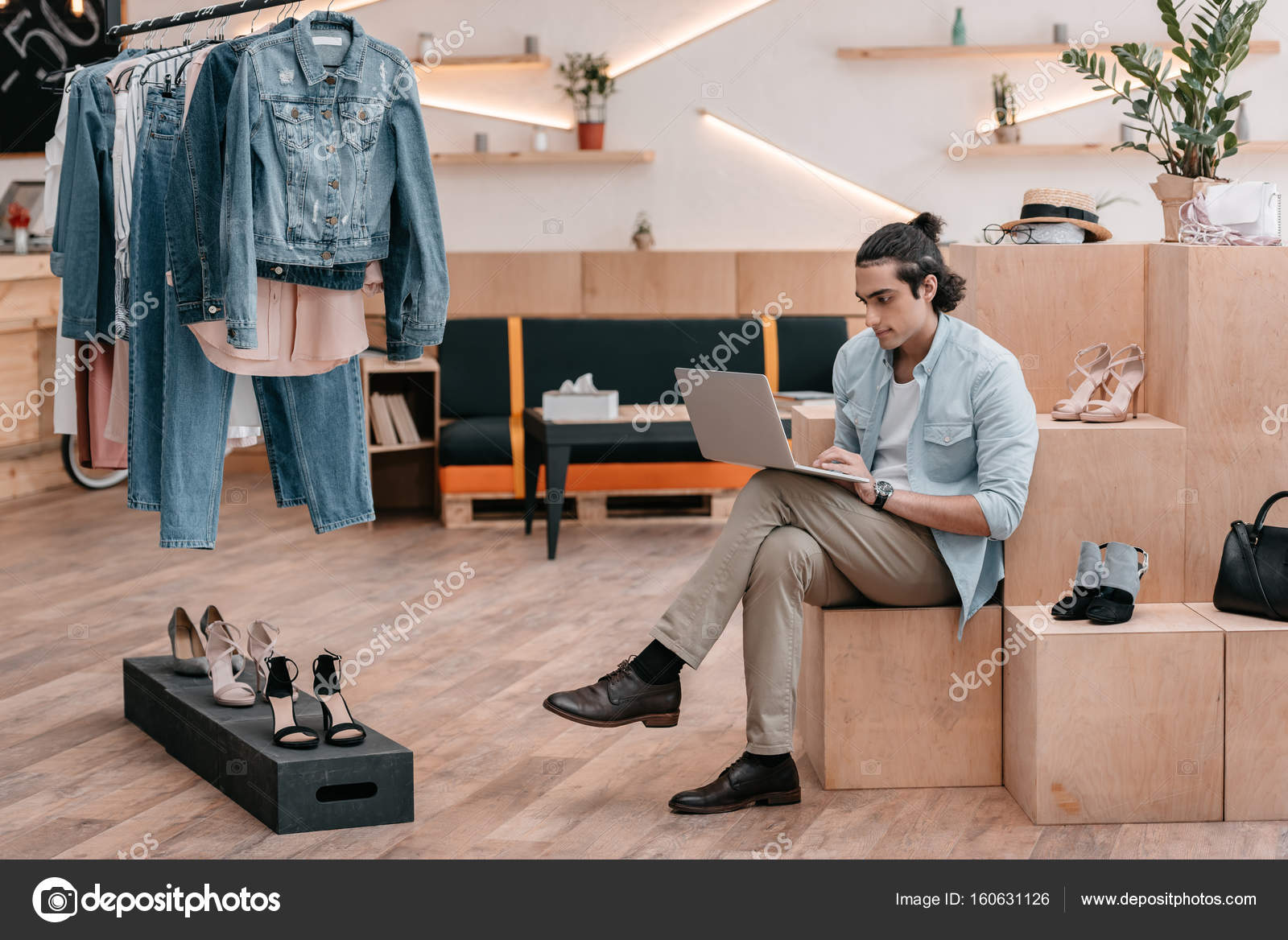 Shop owner using laptop — Stock Photo © AllaSerebrina #160631126