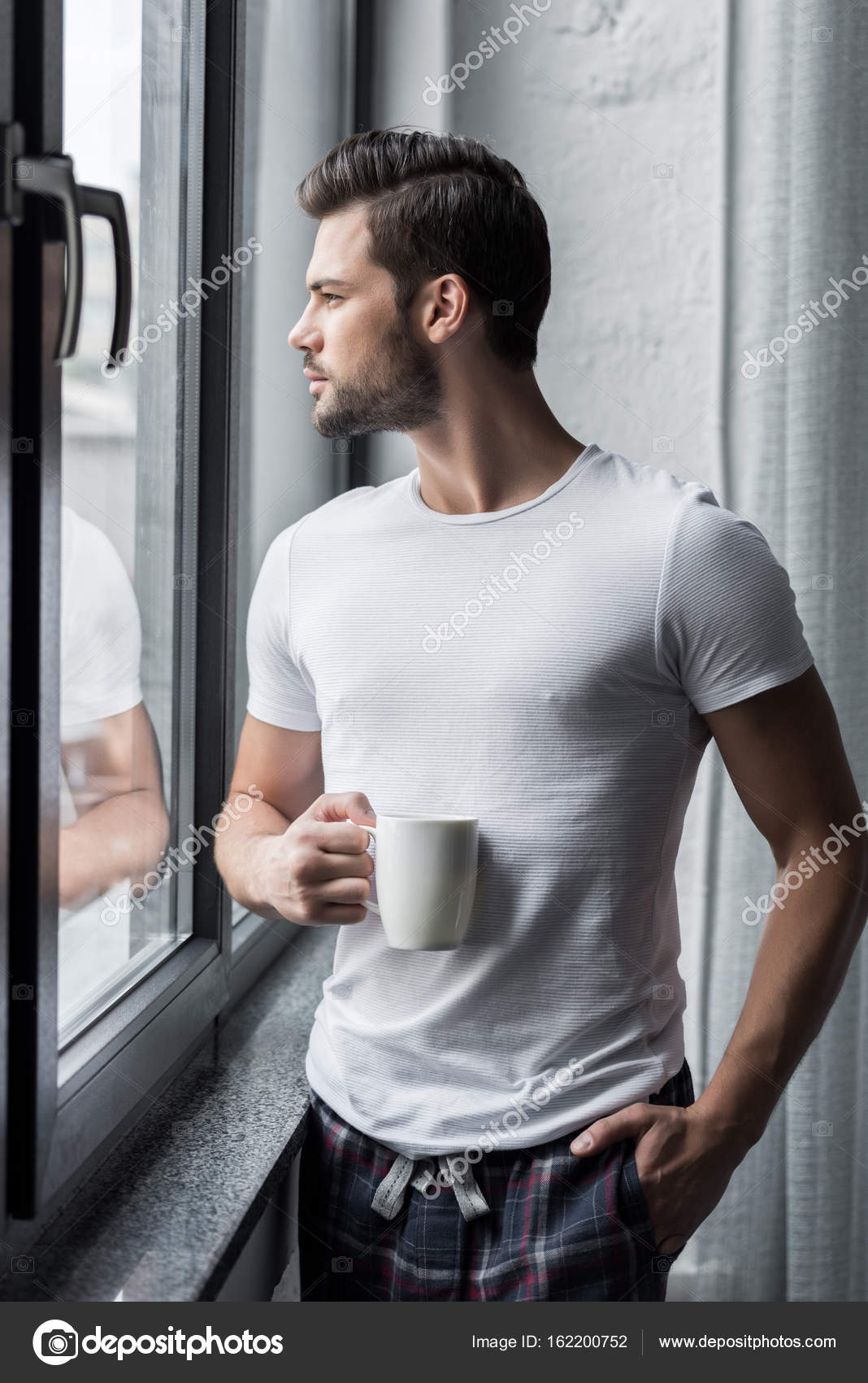 Handsome man with coffee Stock Photo by ©AllaSerebrina 162200752