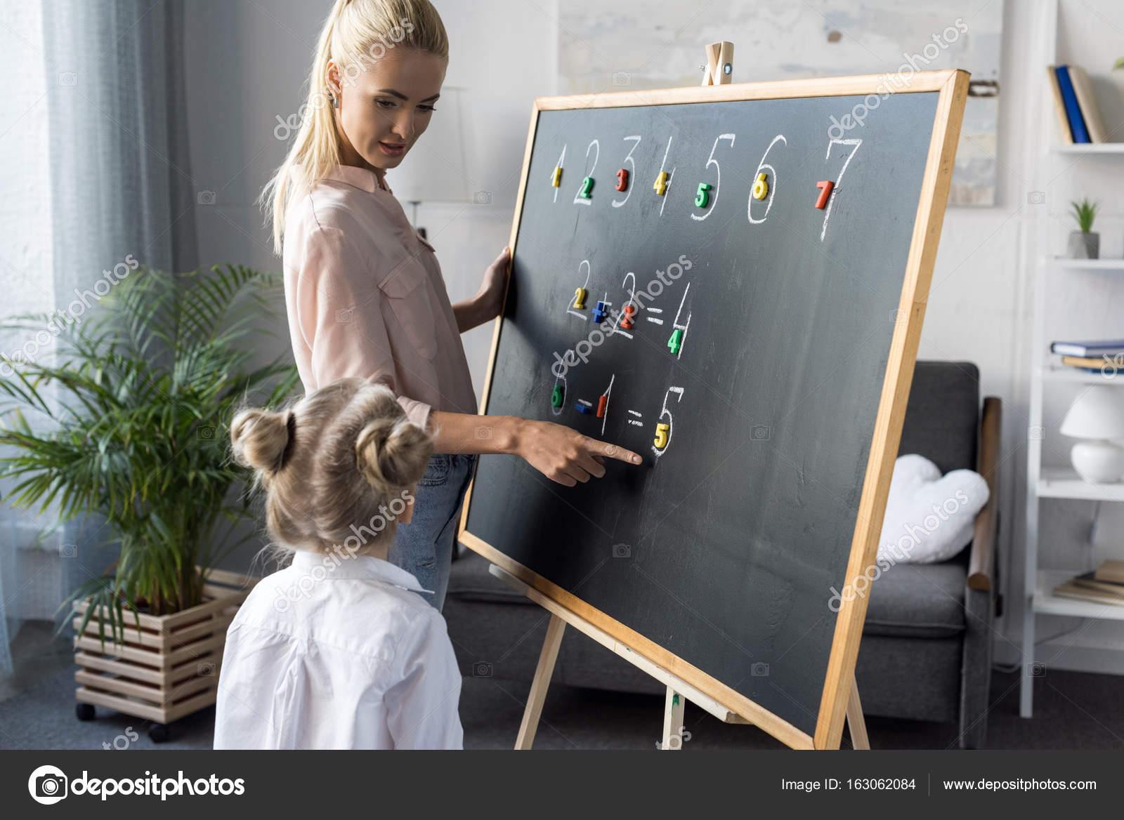 Mother and daughter learning numbers — Stock Photo © AllaSerebrina ...