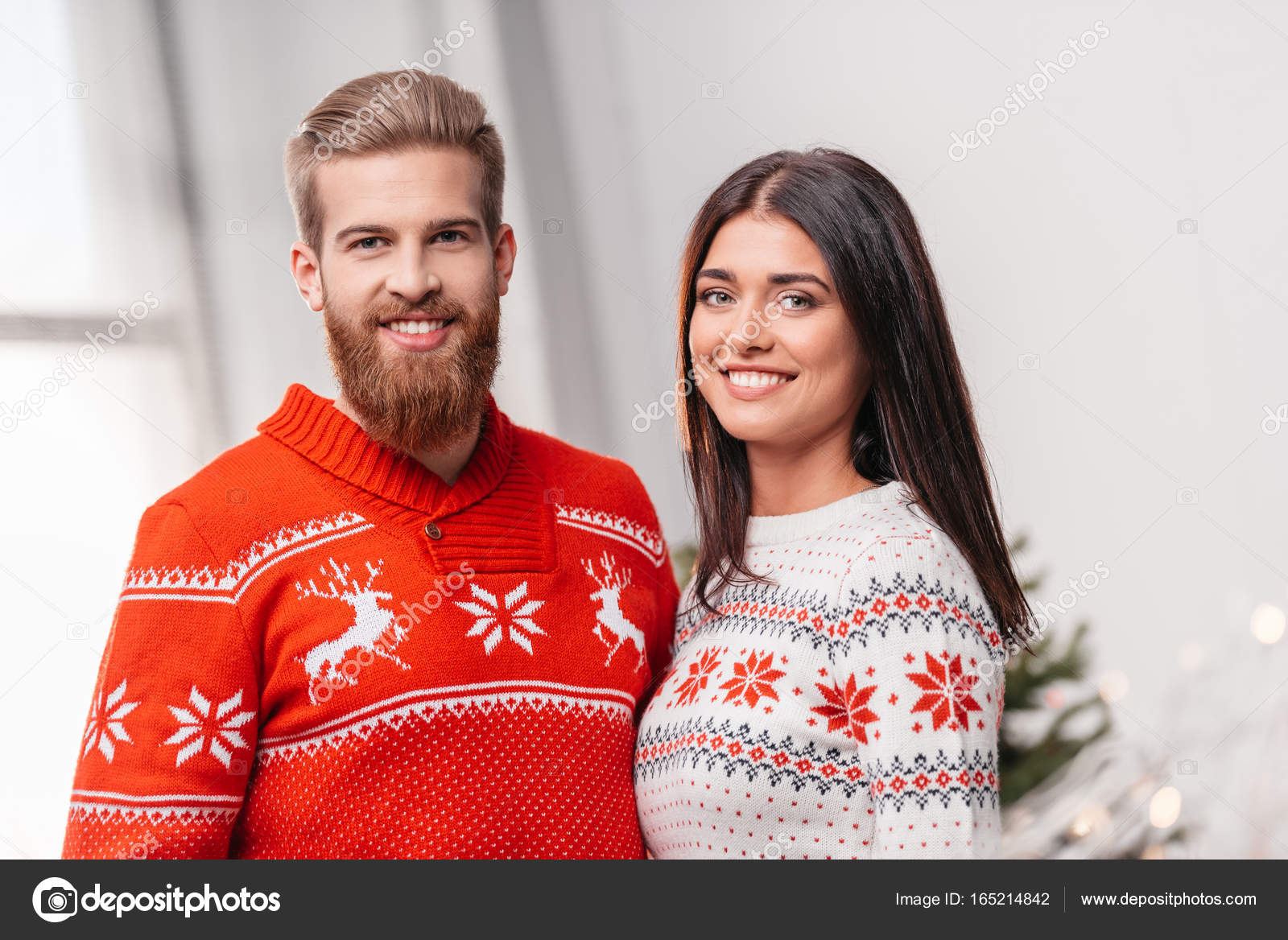 Couple in knitted sweaters — Stock Photo © AllaSerebrina #165214842