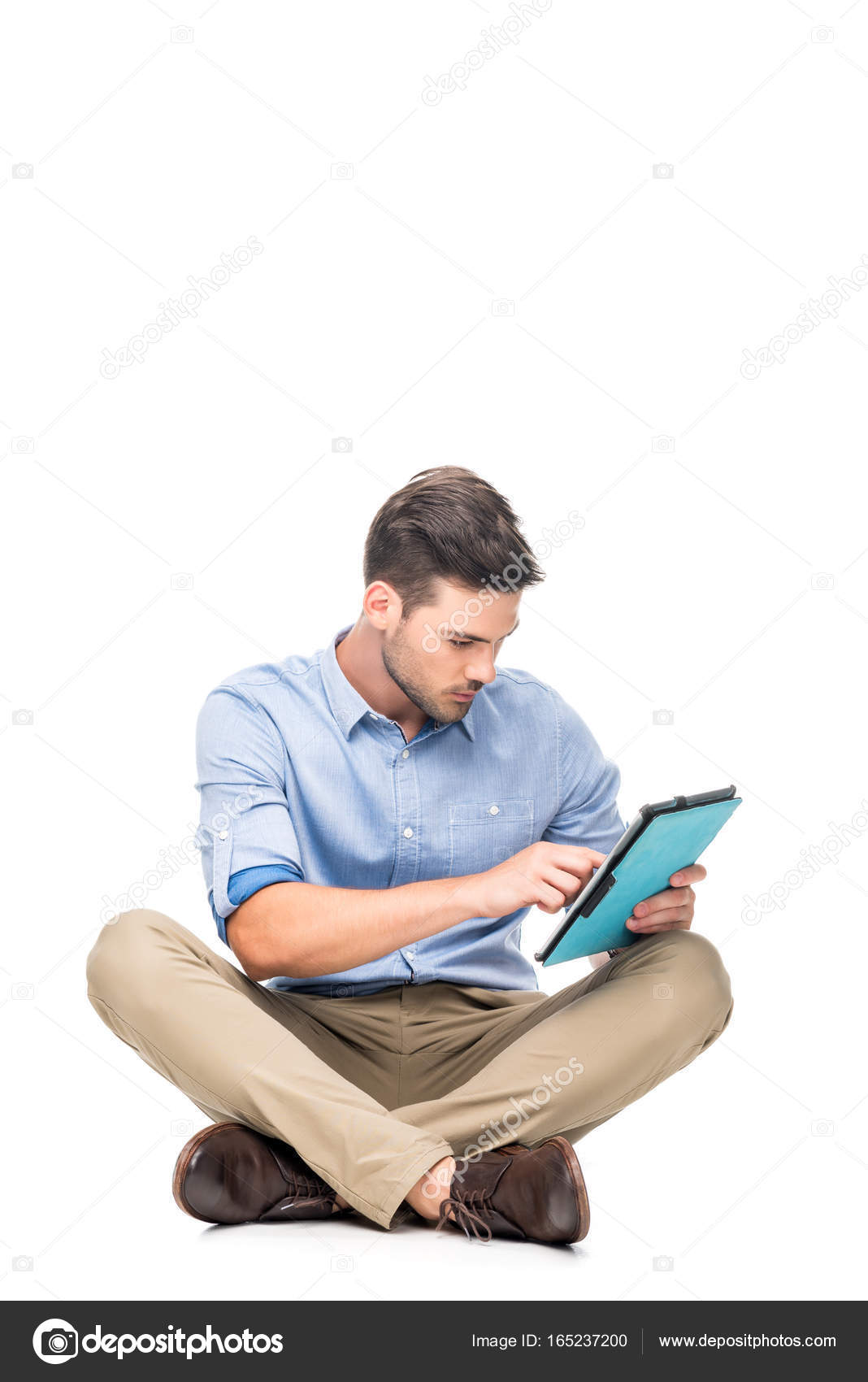 Young man using tablet — Stock Photo © AllaSerebrina #165237200