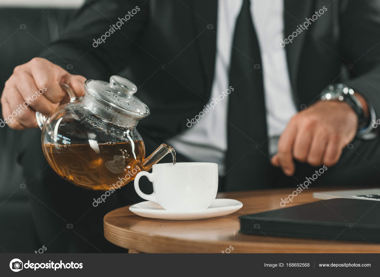 Pouring tea — Stock Photo © AllaSerebrina #168692568