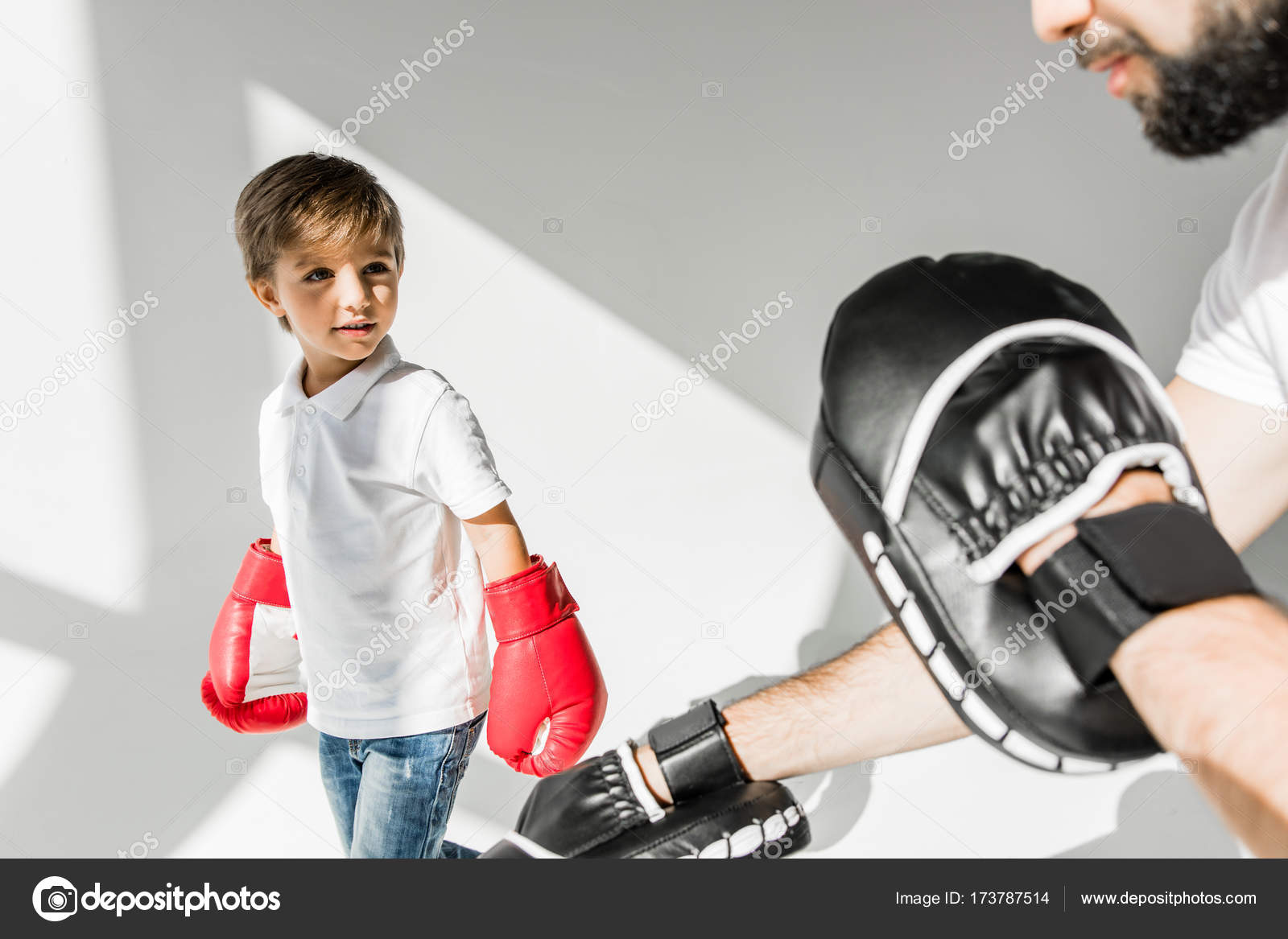 Father and son boxing together Stock Photo by ©AllaSerebrina 173787514