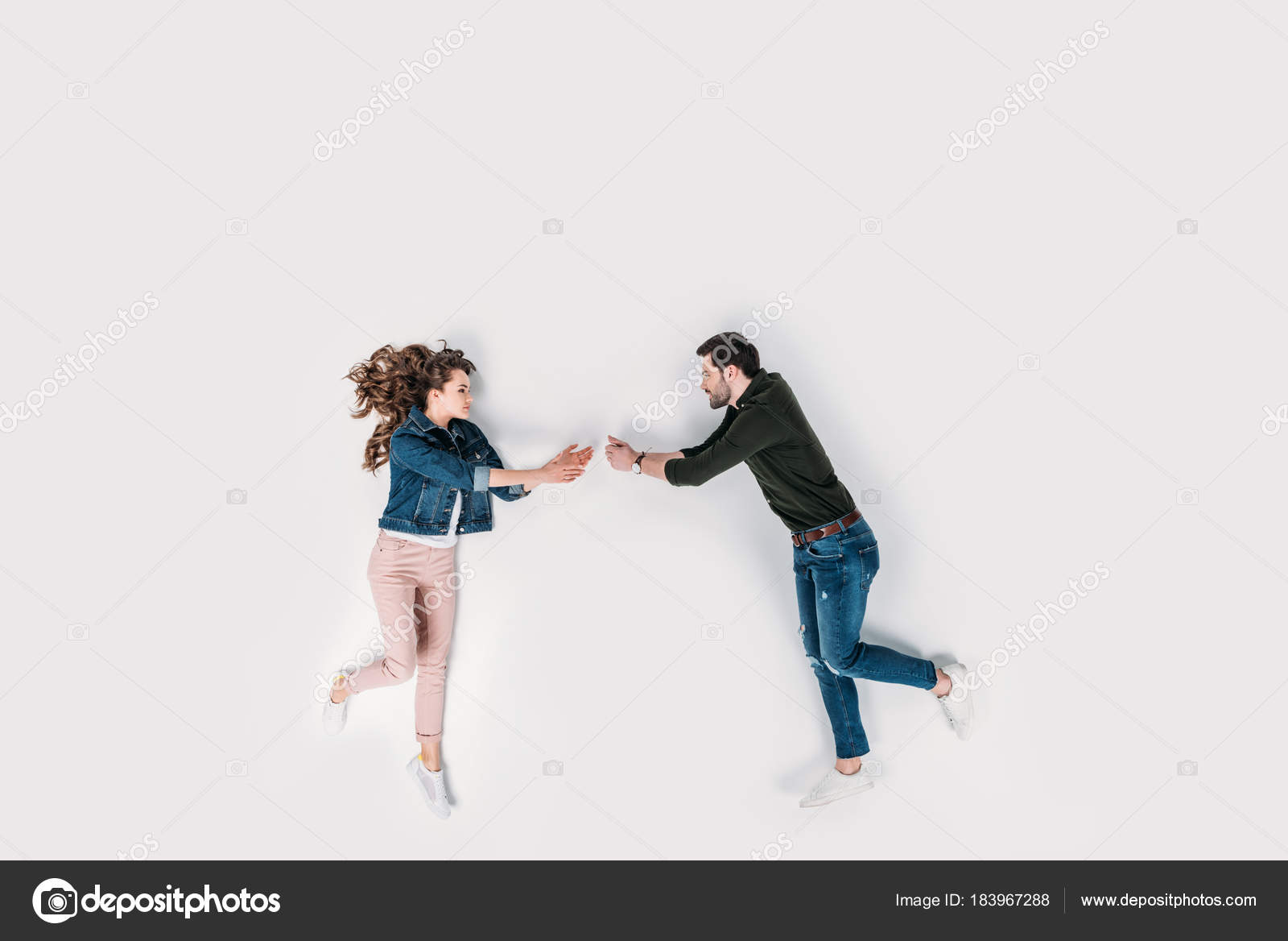 Two People Reaching For Each Other