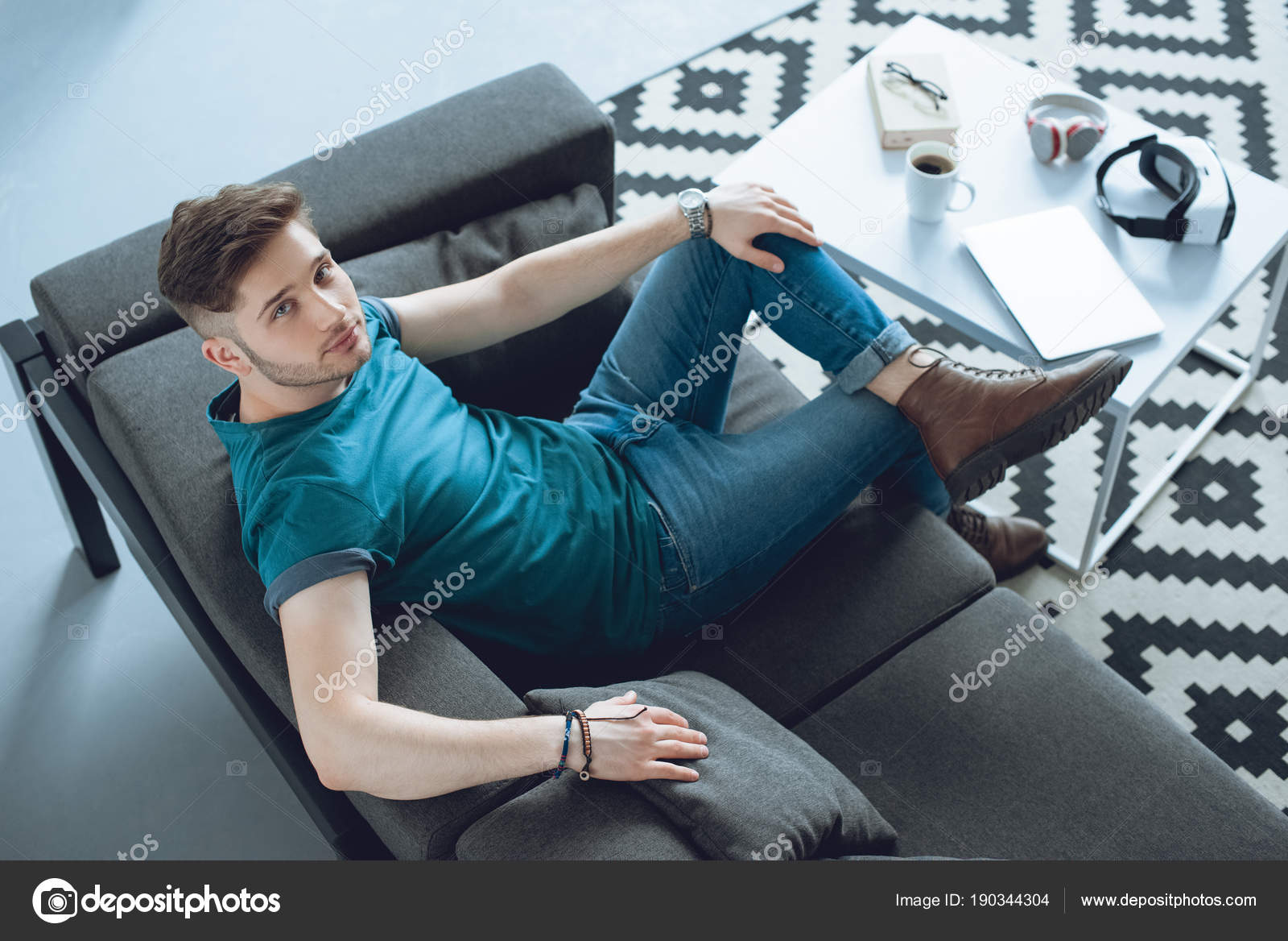 High Angle View Handsome Young Man Sitting Couch Looking Camera — Free ...