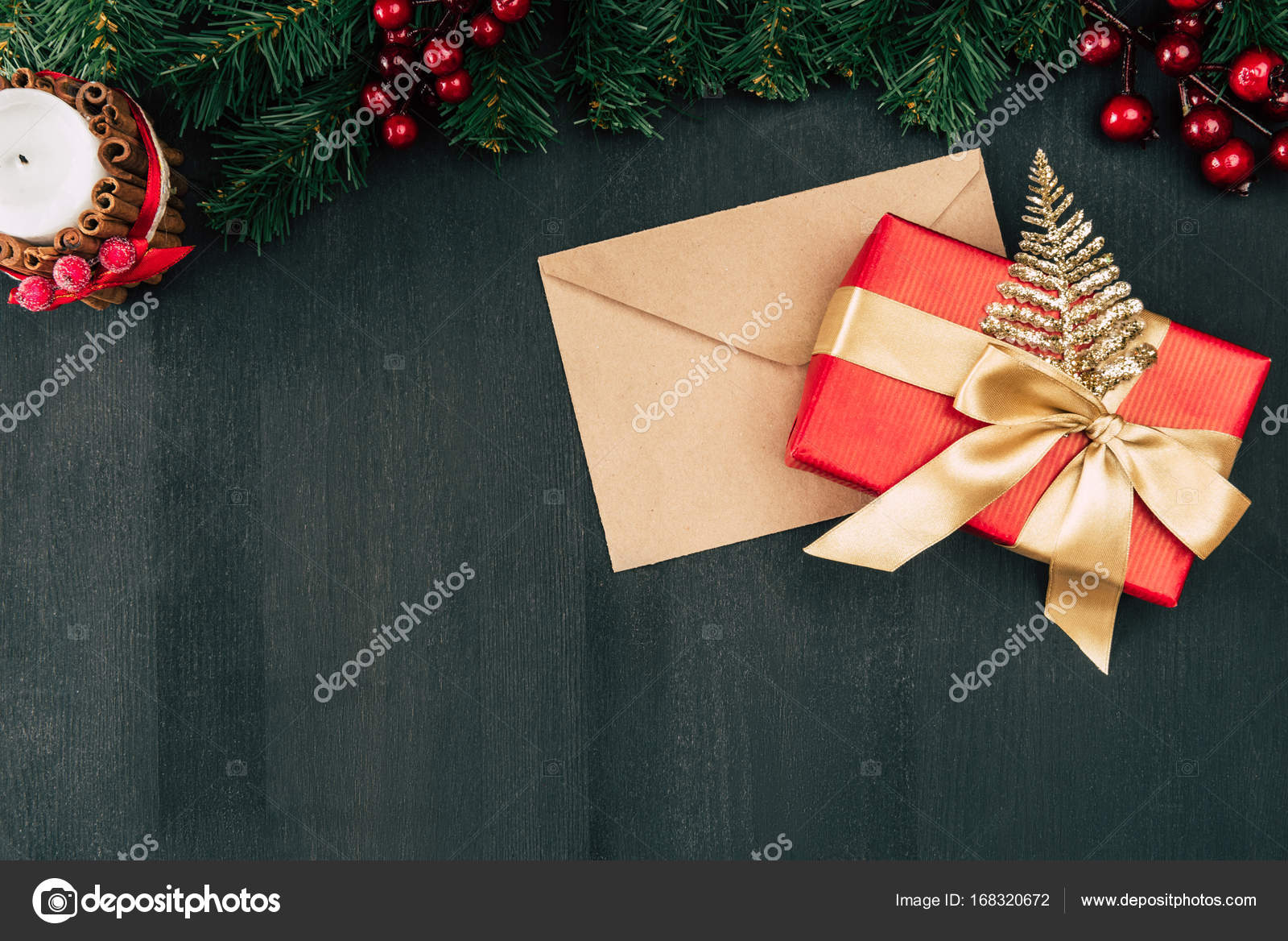 Christmas gift and envelope — Stock Photo © EdZbarzhyvetsky #168320672