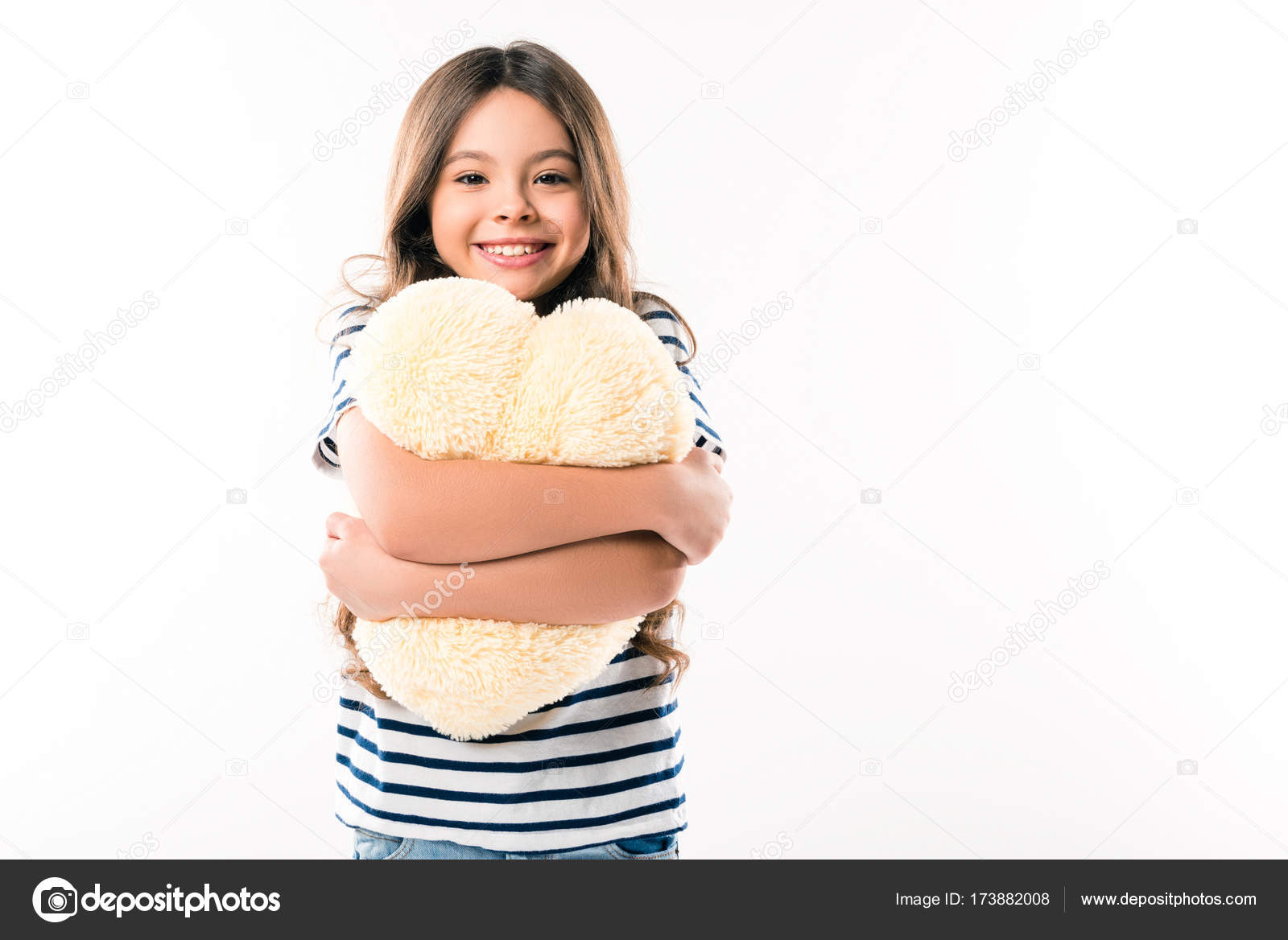 Child hugging heart shaped pillow Stock Photo by ©EdZbarzhyvetsky 173882008