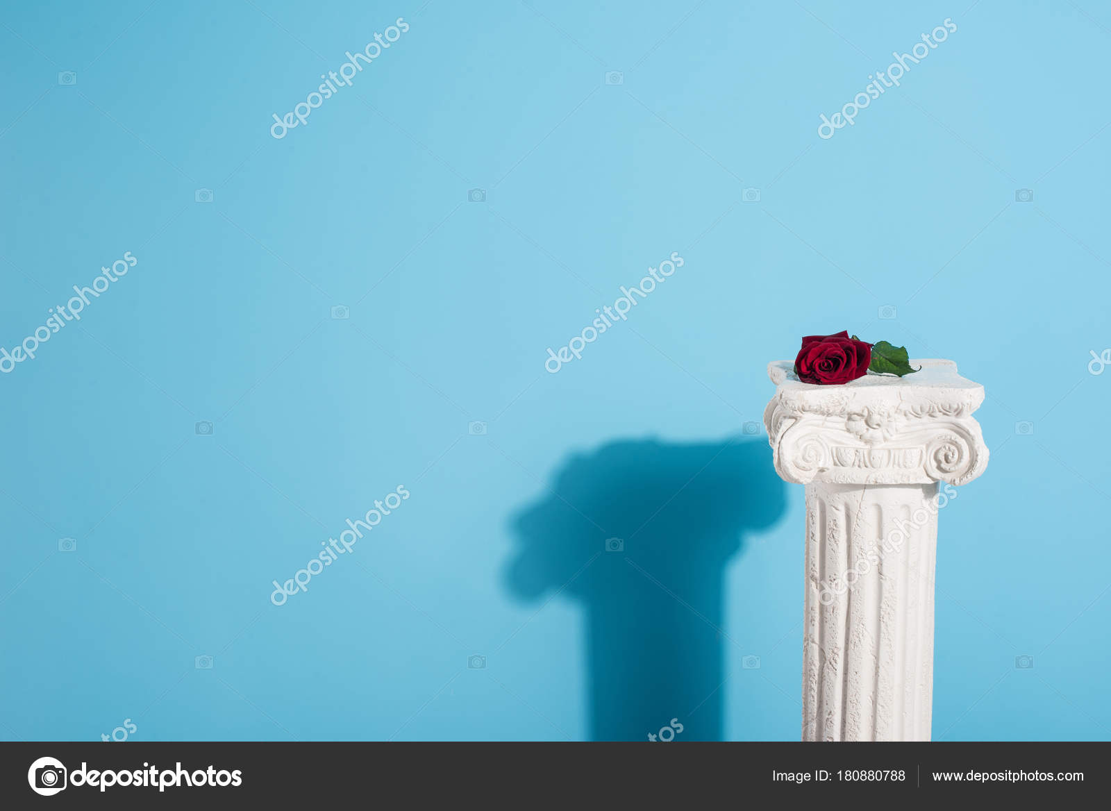 One Red Rose White Column Blue — Stock Photo © EdZbarzhyvetsky #180880788