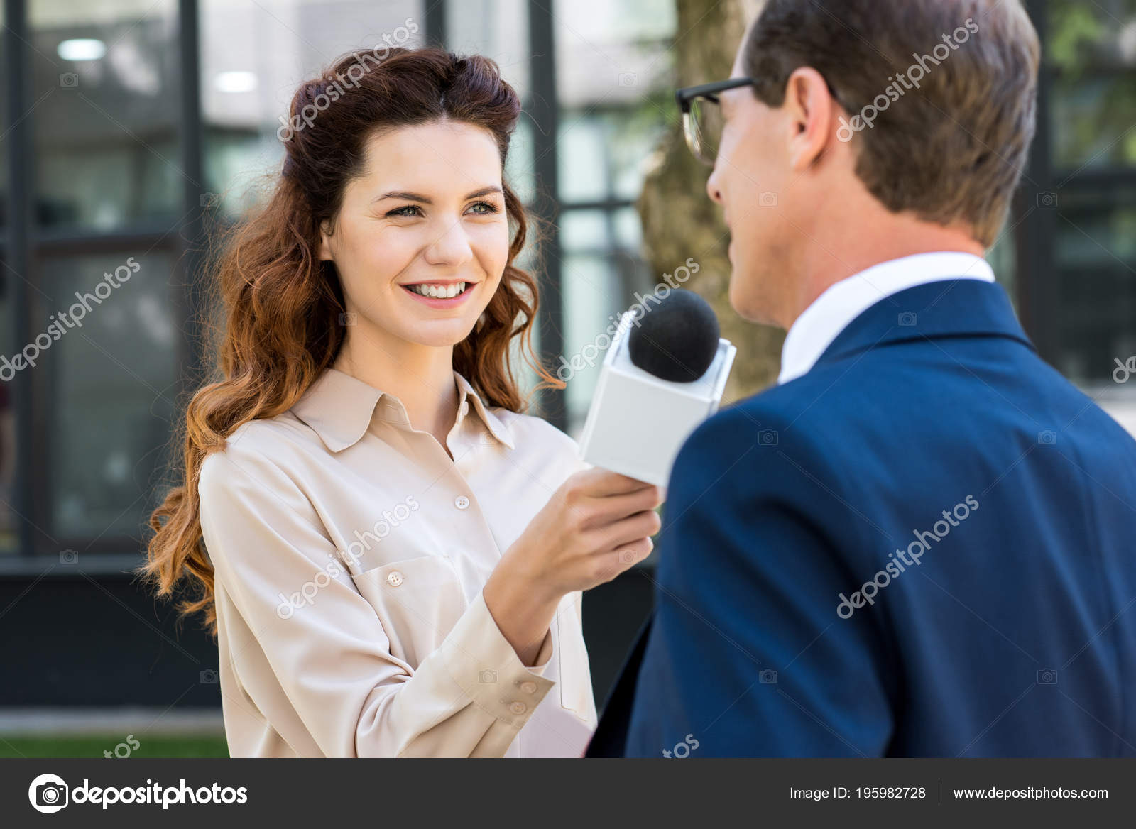 Beautiful News Reporter Microphone Interviewing Businessman Stock Photo ...