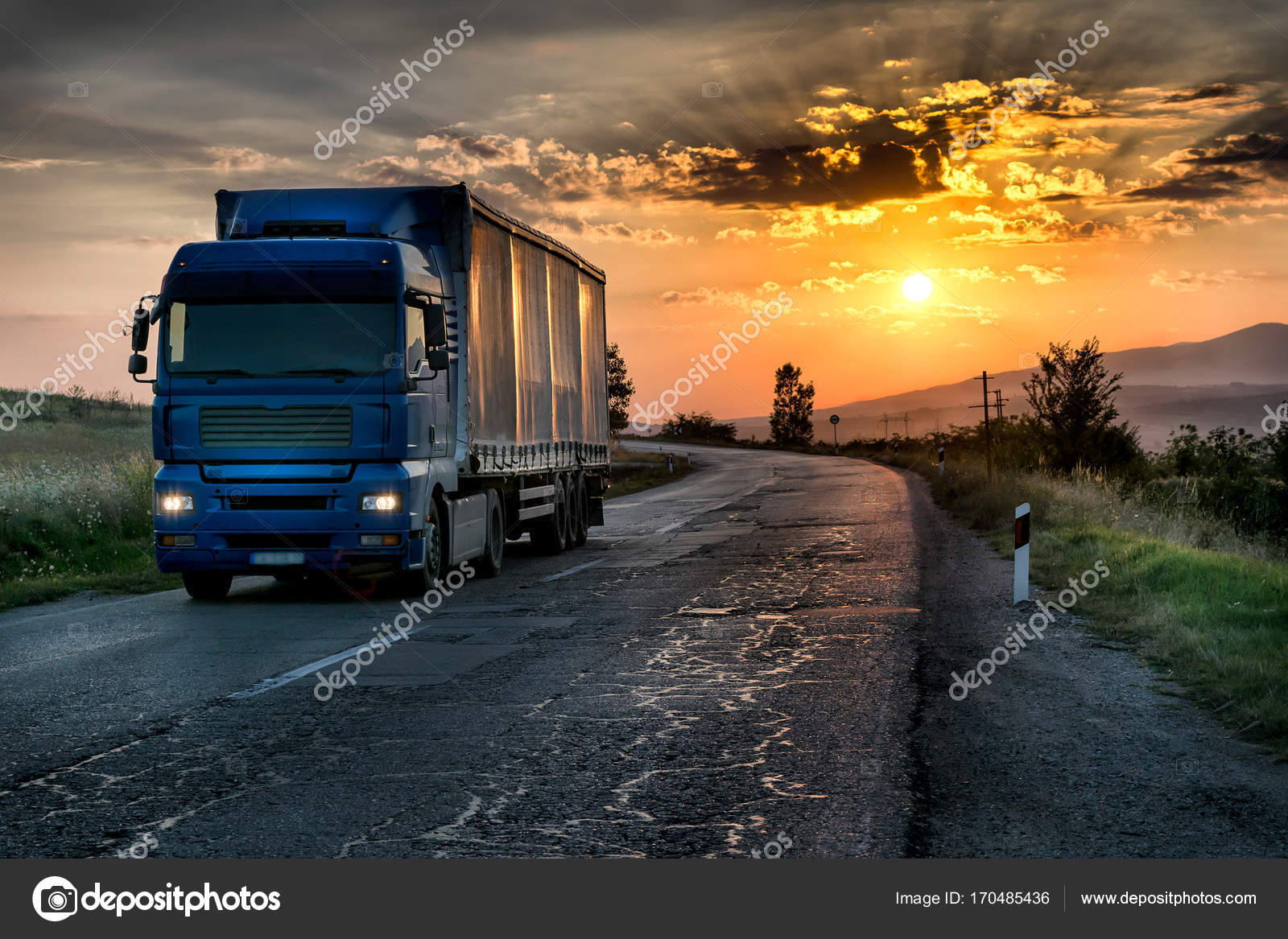 Blue lorry on the asphalt rural road — Stock Photo © wr7films@yaho.com ...