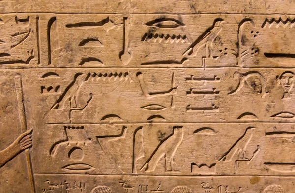 Hieroglyphic carvings on the exterior walls of an ancient egyptian ...