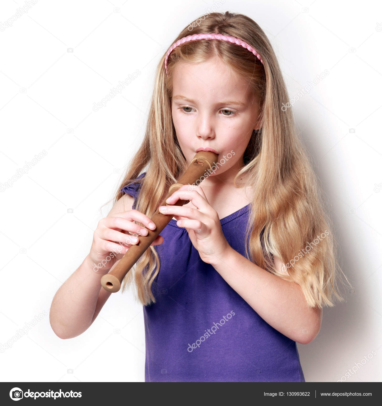 Little girl with soprano recorder Stock Photo by ©ahavelaar 130993622