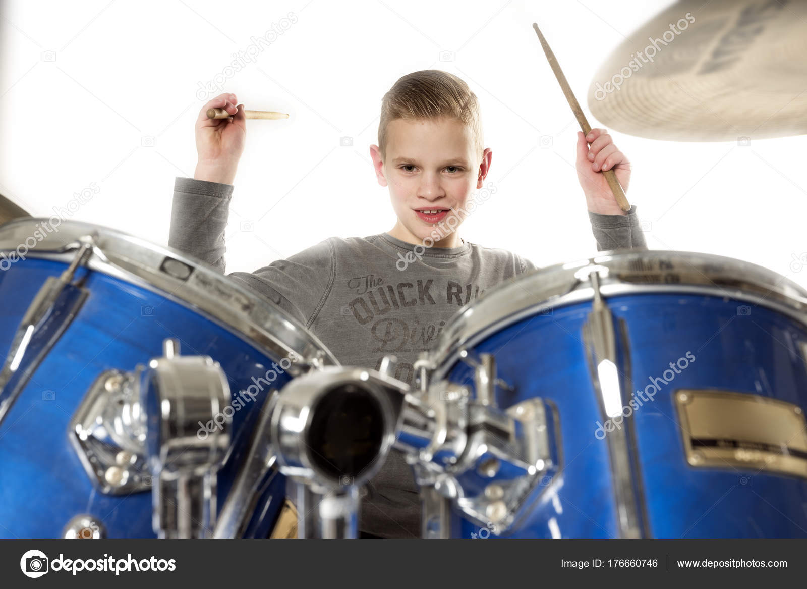 Teenage Boy Playing Drums
