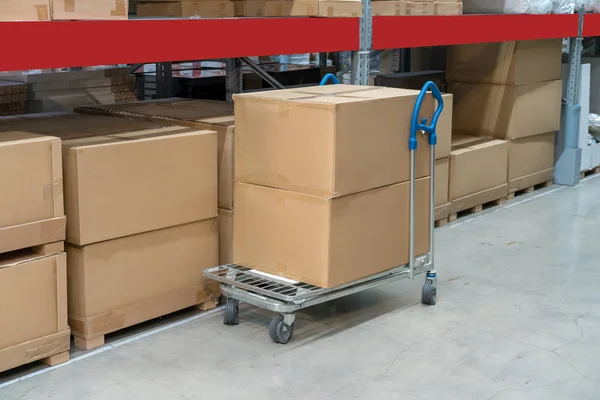 Packaged boxes and cartons on wooden pallets Stock Photo by ©vvoennyy ...