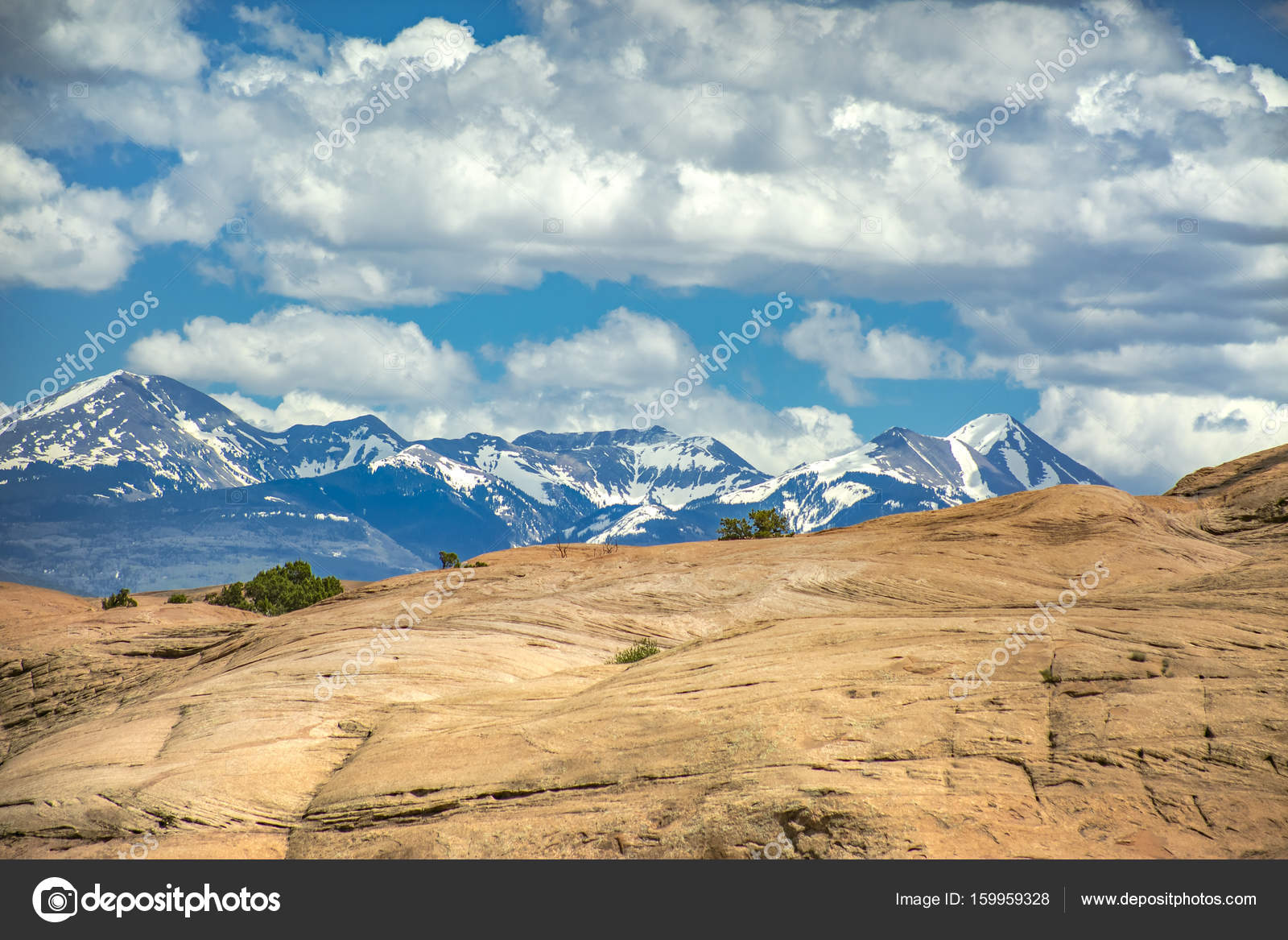 Desert mountains and snow capped mountains contrasted Stock Photo by ...