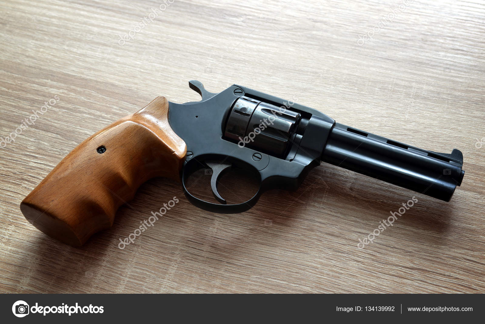 Black revolver pistol Stock Photo by ©vencav 134139992