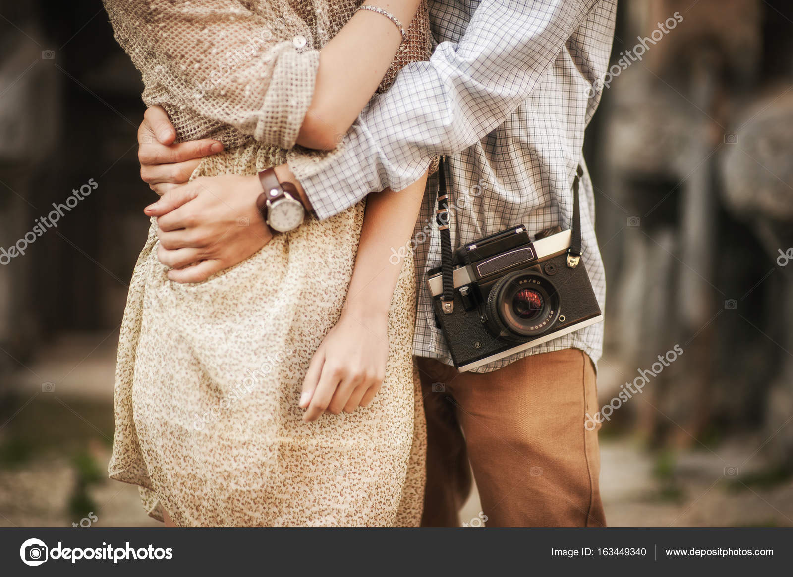 Young romantic couple hugging — Stock Photo © LadanivskyyO #163449340