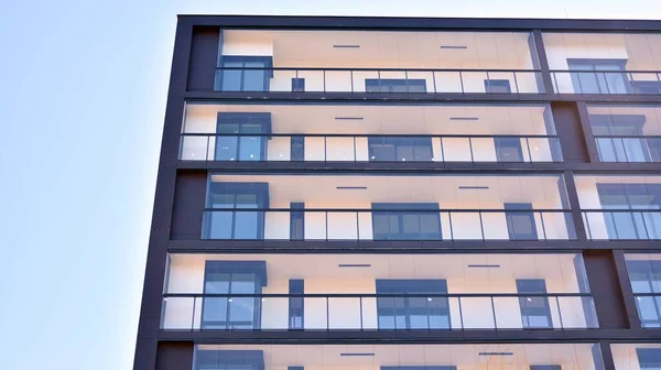Modern condo building with big windows and modern facade. - Stock Image ...